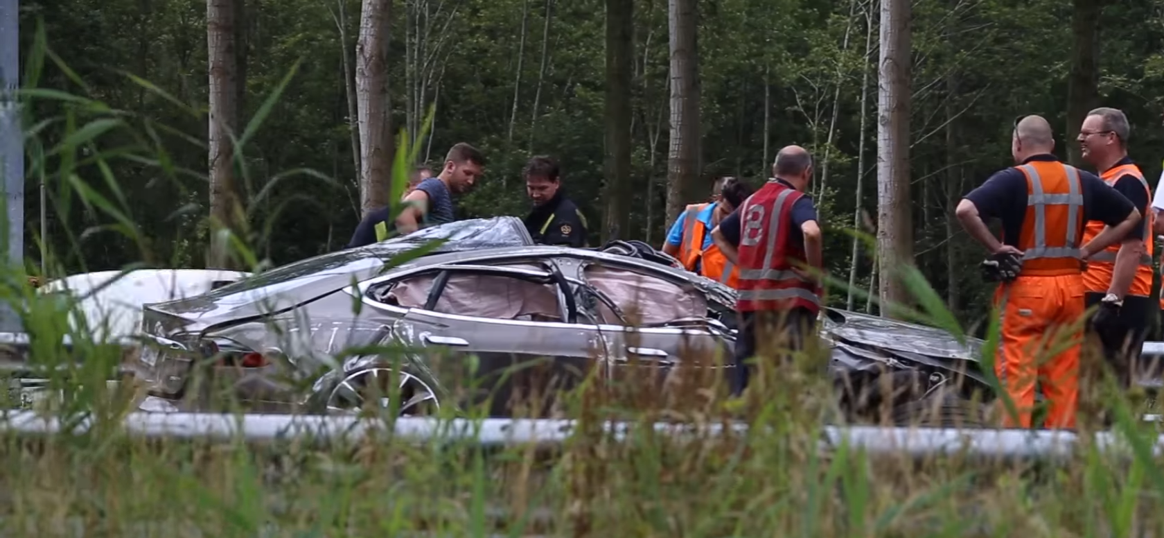 Tesla Model S driver and 8-yr-old son survive 80mph rollover truck ...