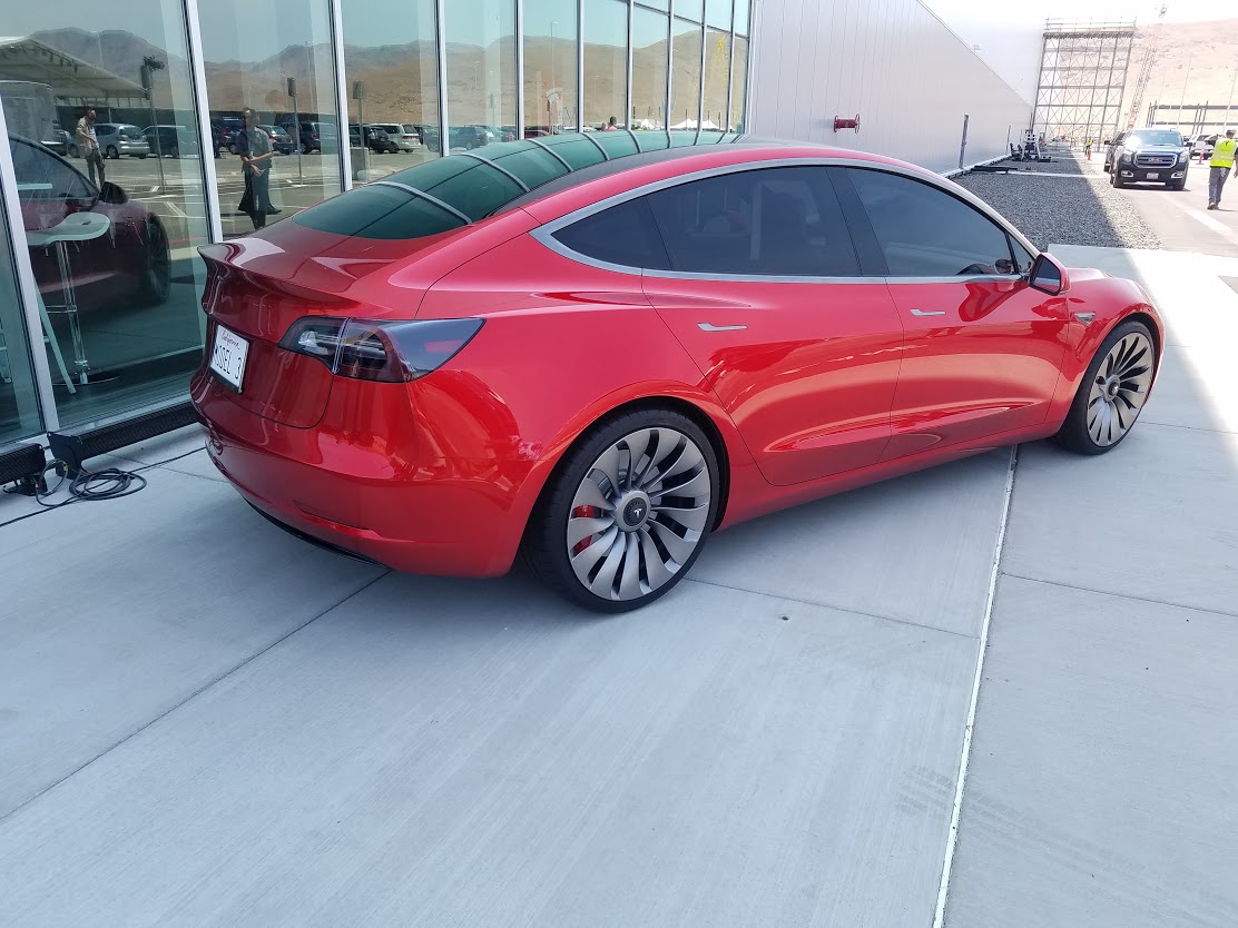 Tesla Model 3 rare red prototype displayed at the Tesla Gigafactory ...