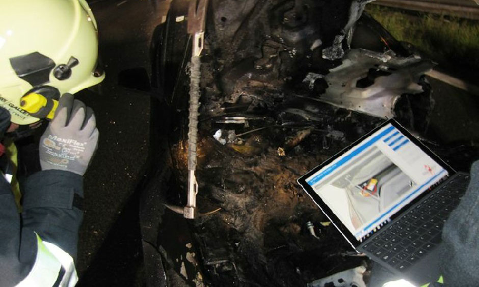 Behind the scene look at how firefighters disable a Tesla battery while ...