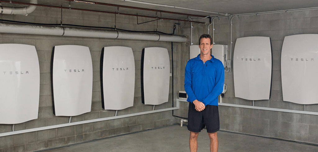 Tesla Energy and solar installation with 6 Powerwall units cutting ...