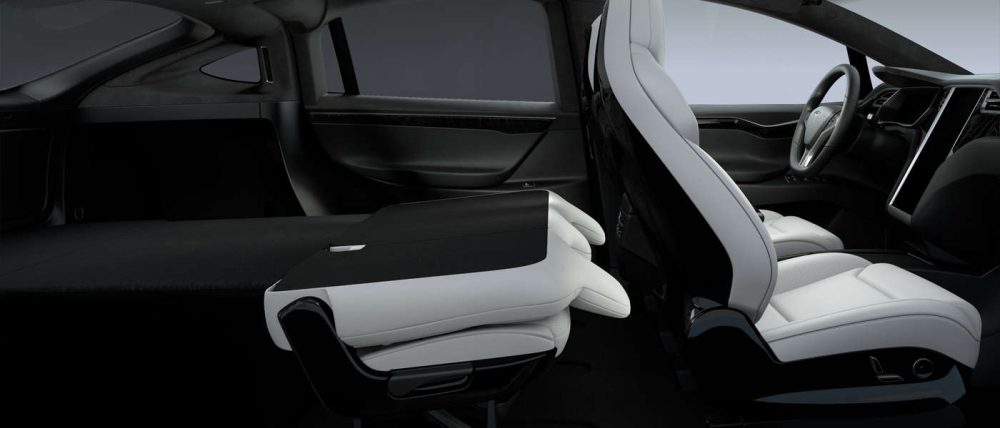 Tesla introduces new fold-flat seats config in Model X, making it SUV ...