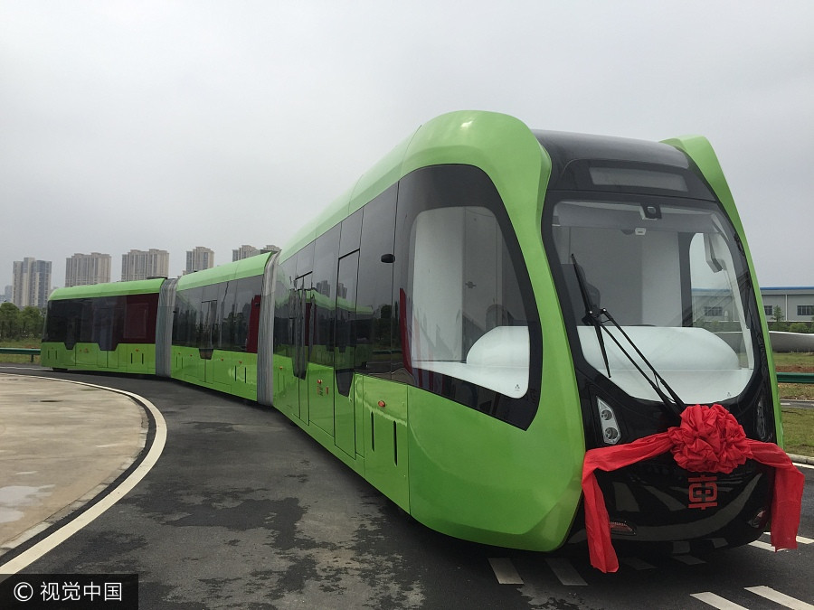 A new 'trackless electric train' (aka a bus) starts testing in China ...
