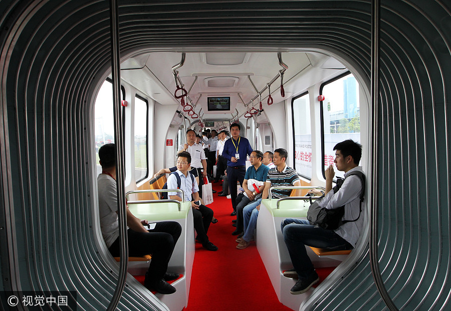 A new 'trackless electric train' (aka a bus) starts testing in China ...