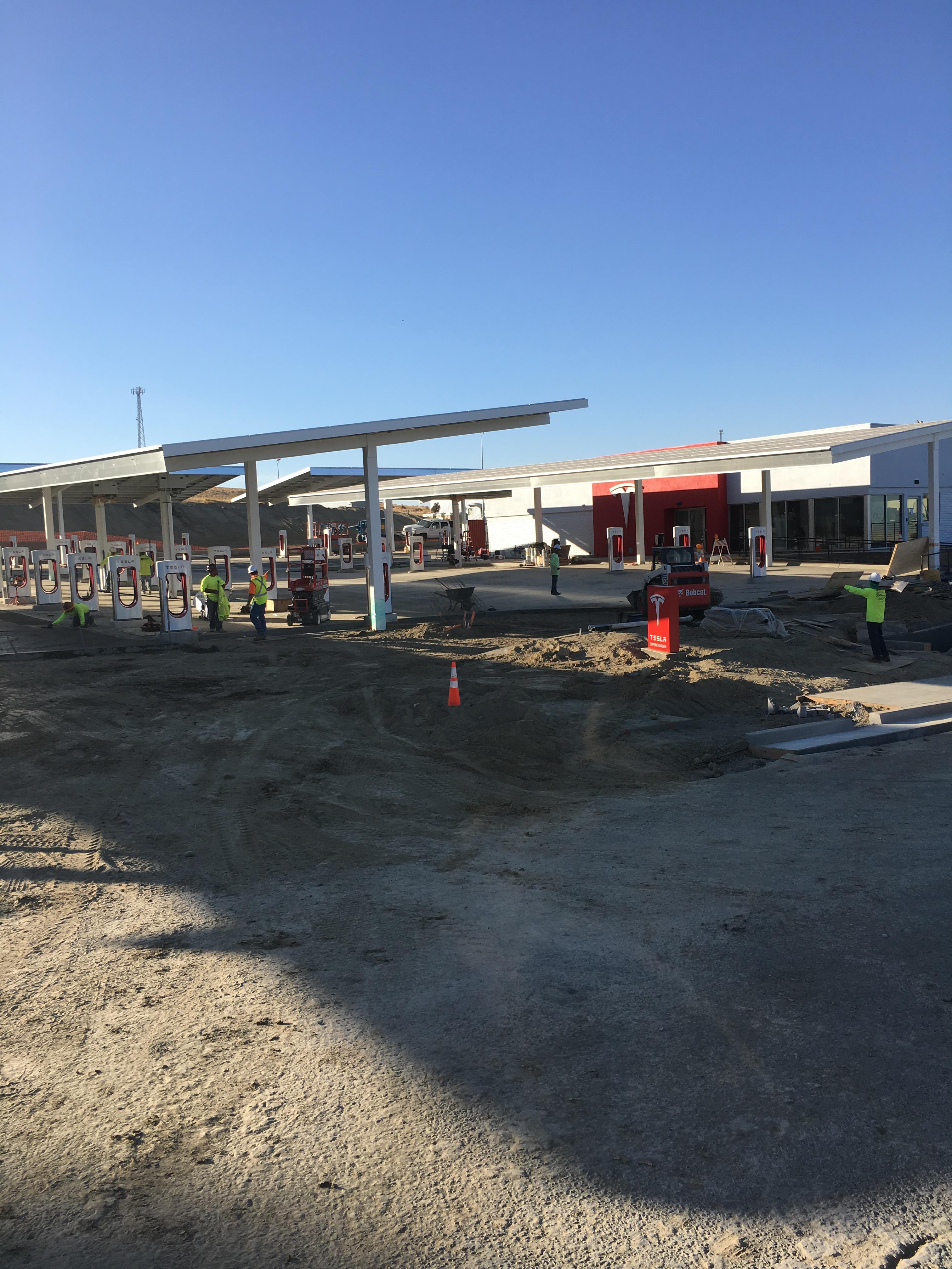 First look at Tesla's new kind of Supercharger with solar arrays and ...