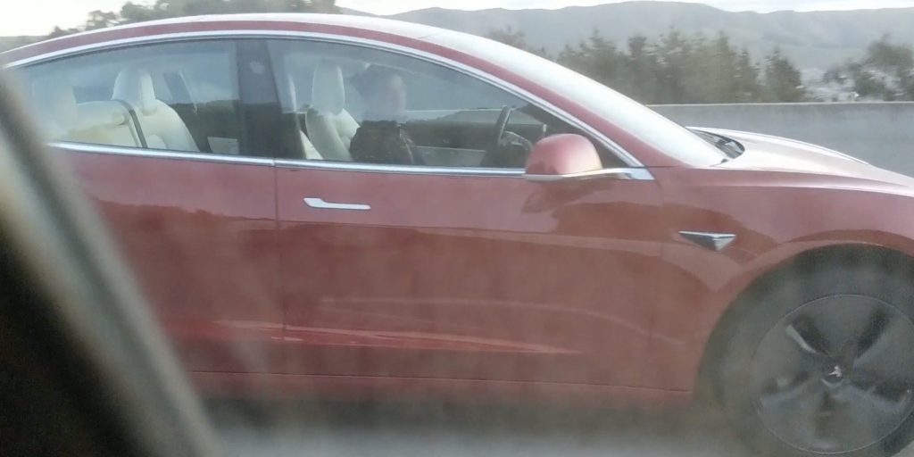 Tesla Model 3 with new white interior spotted in the wild - Electrek