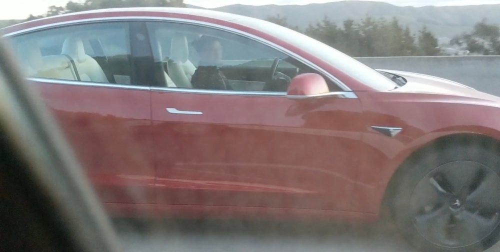 Tesla Model 3 with new white interior spotted in the wild - Electrek