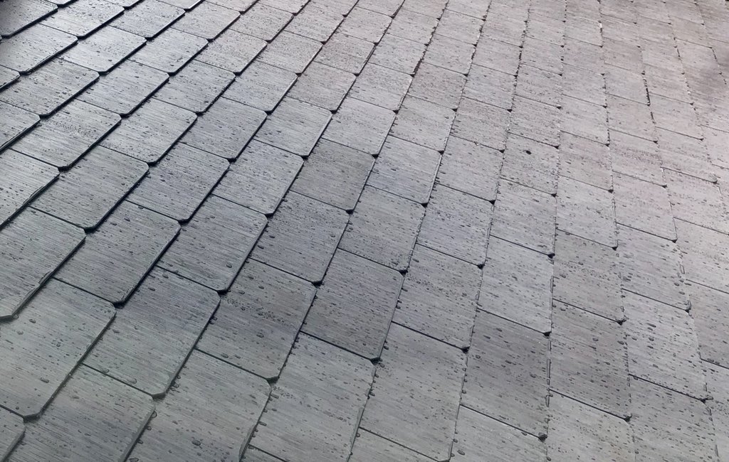 A look at latest Tesla solar roof tile installation - Electrek