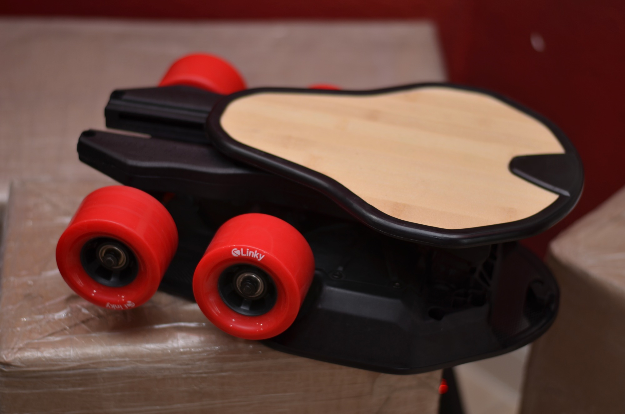Linky folding electric longboard review: four-wheeled EV fun that fits ...