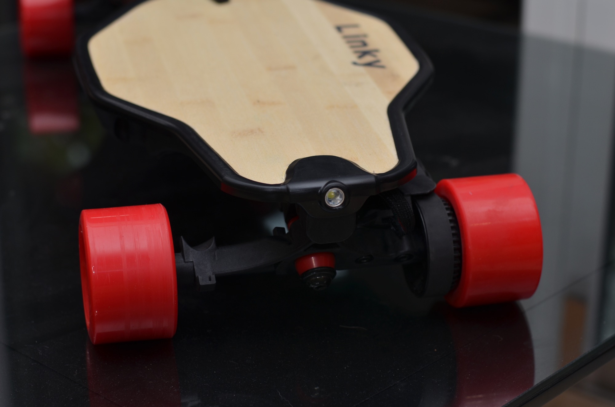 Linky folding electric longboard review: four-wheeled EV fun that fits ...