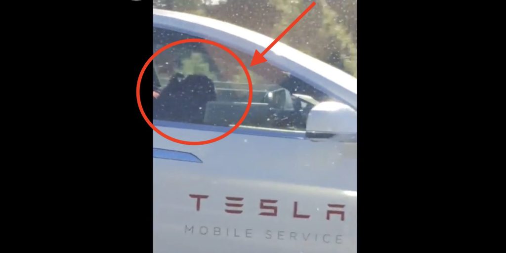 Tesla employee was filmed sleeping or unconscious at the wheel driving ...