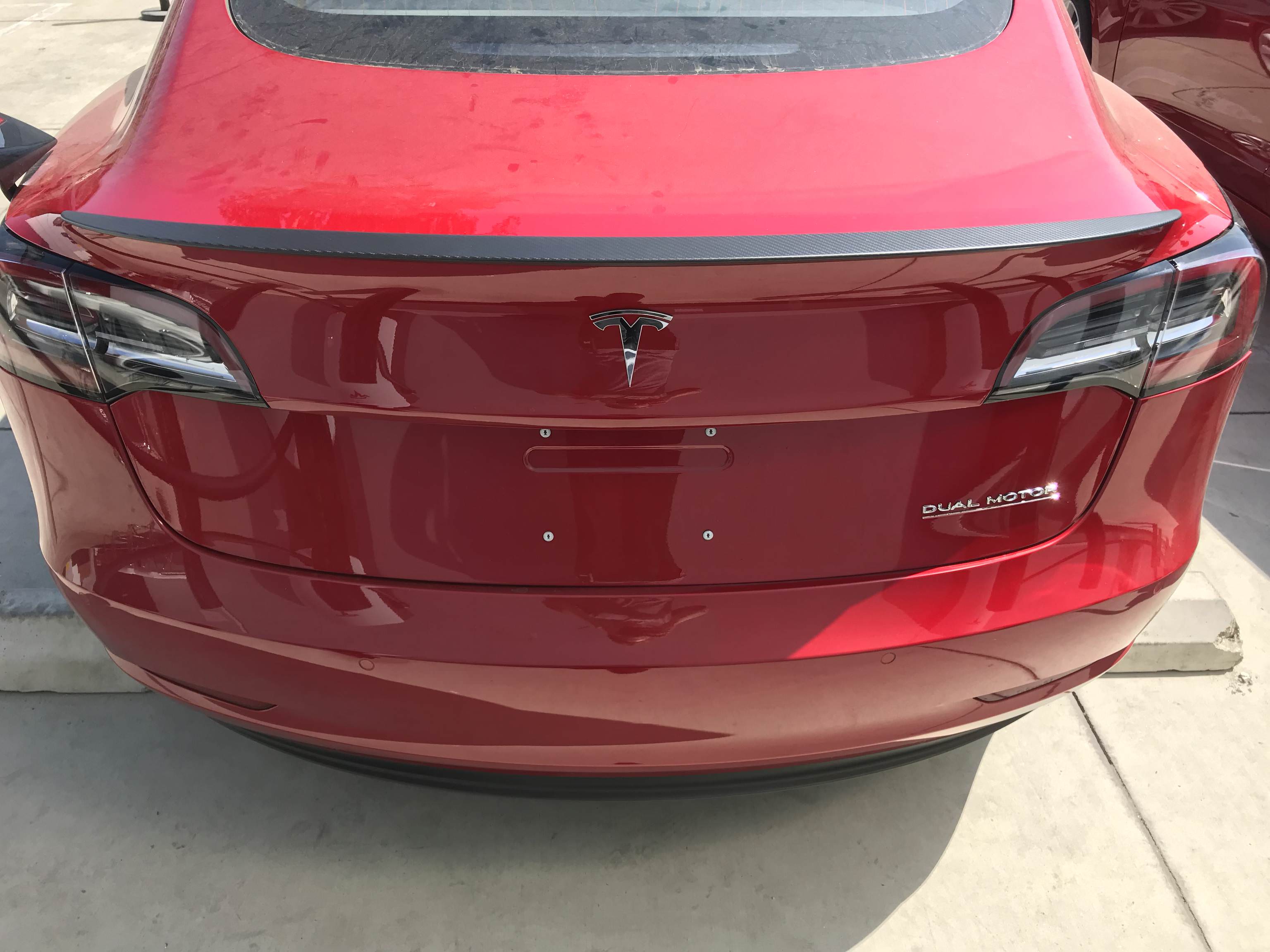 First look at Tesla Model 3 Performance version with spoiler and new ...