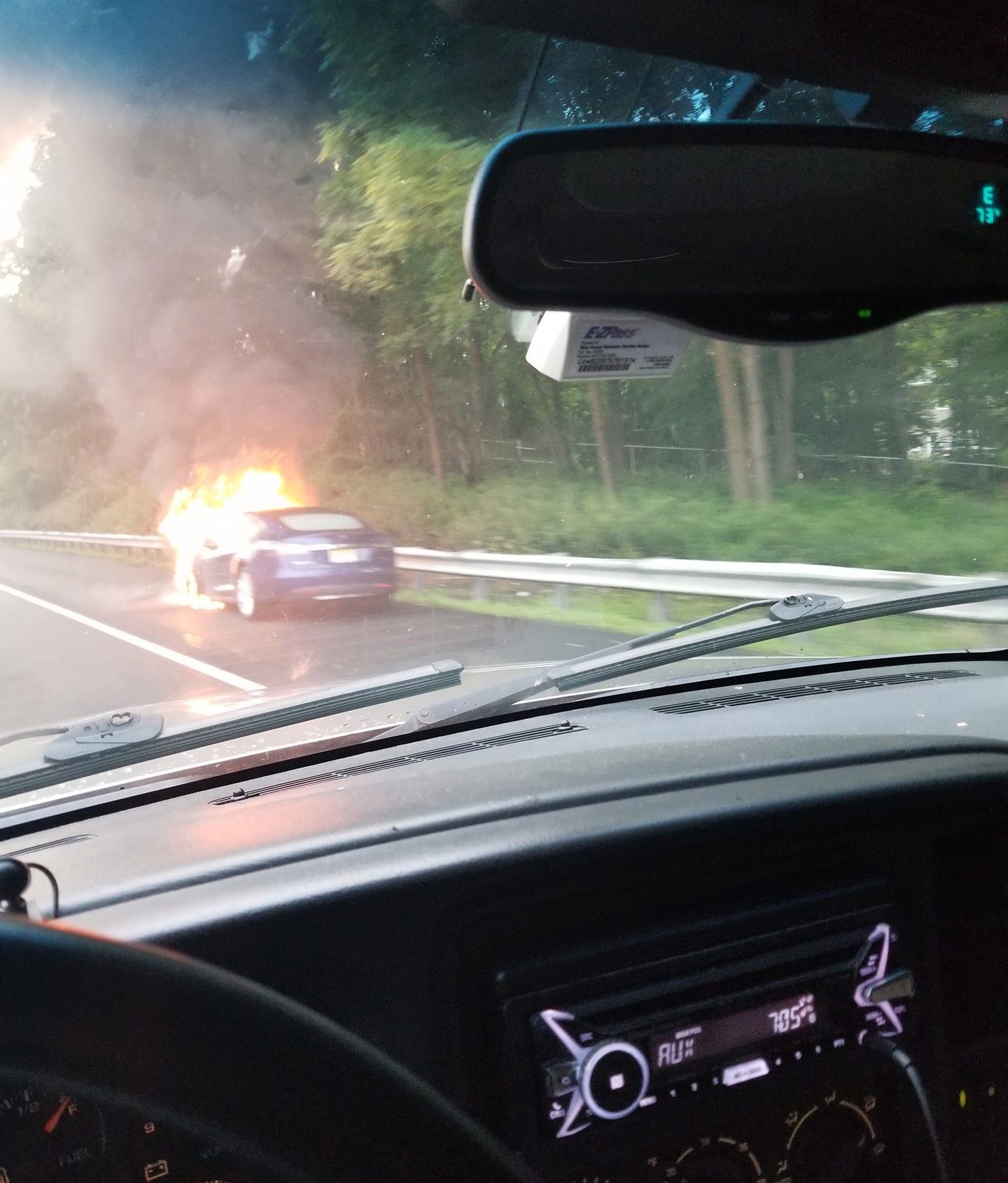 A Tesla Model S caught on fire on the highway after 'hitting a ...