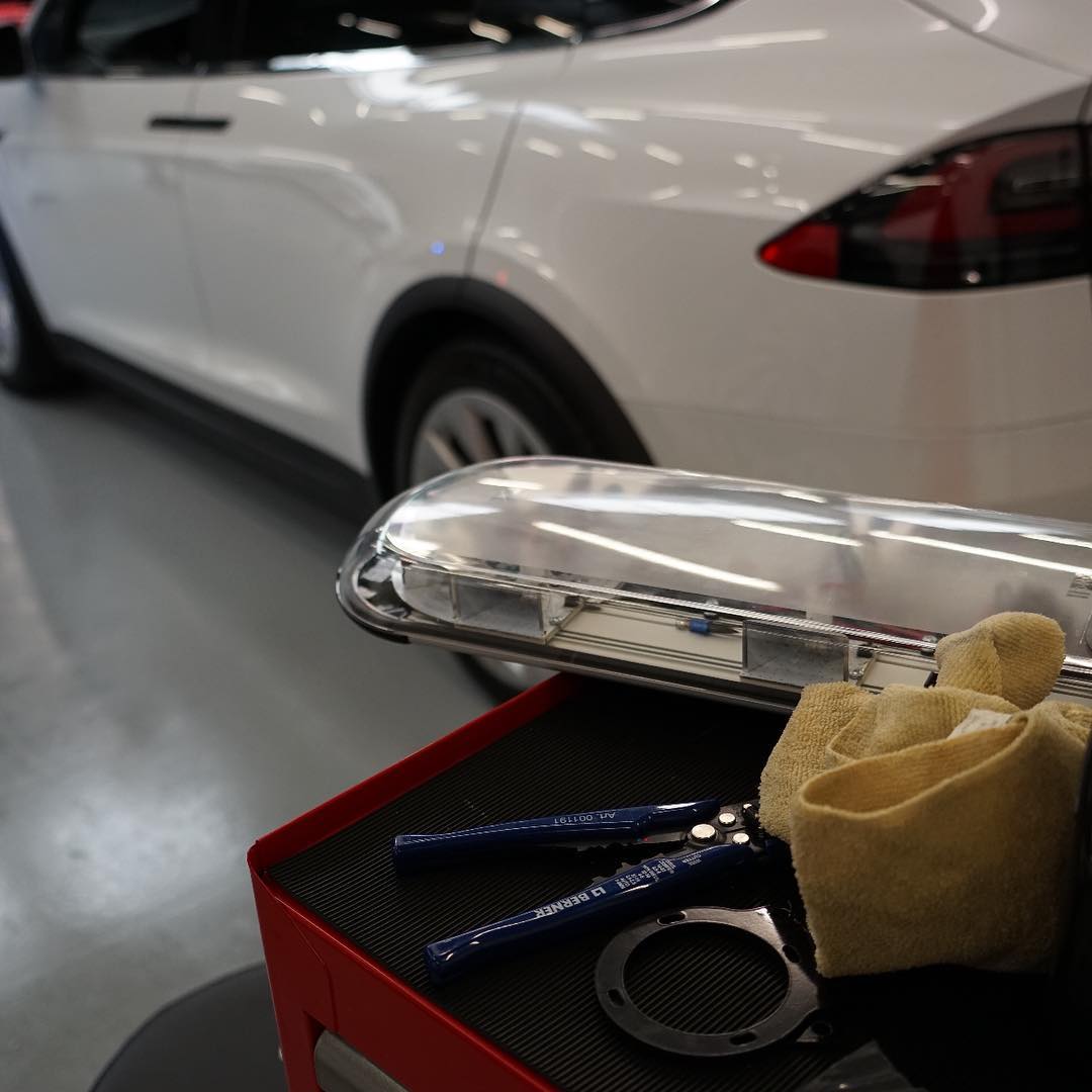 Watch a Tesla Model X electric SUV becoming a police vehicle