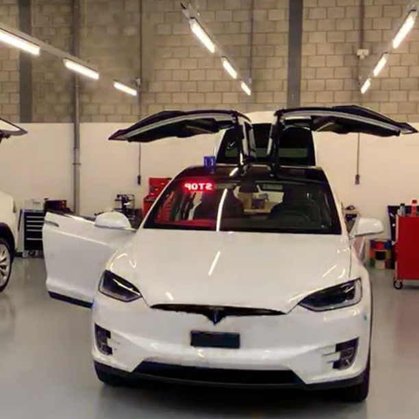 Watch a Tesla Model X electric SUV becoming a police vehicle