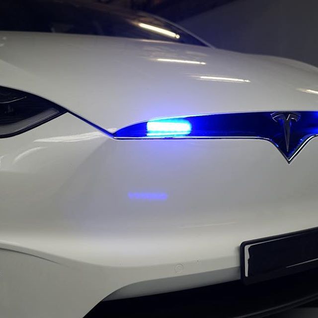Watch a Tesla Model X electric SUV becoming a police vehicle