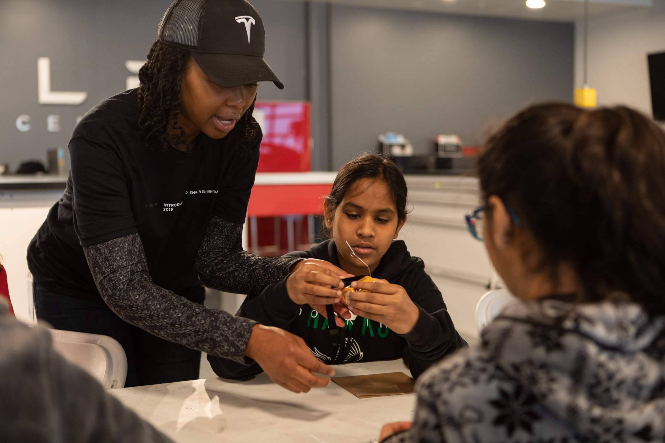 Tesla hosts hundreds of students for 'Introduce a Girl to Engineering ...