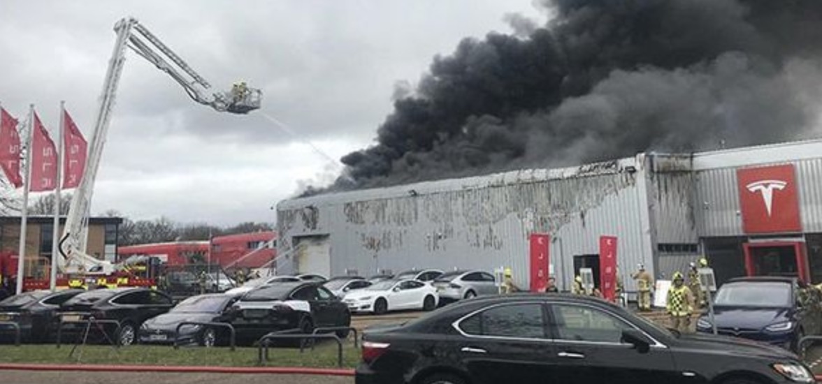 Tesla store caught on fire in Surrey, half the building has been ...