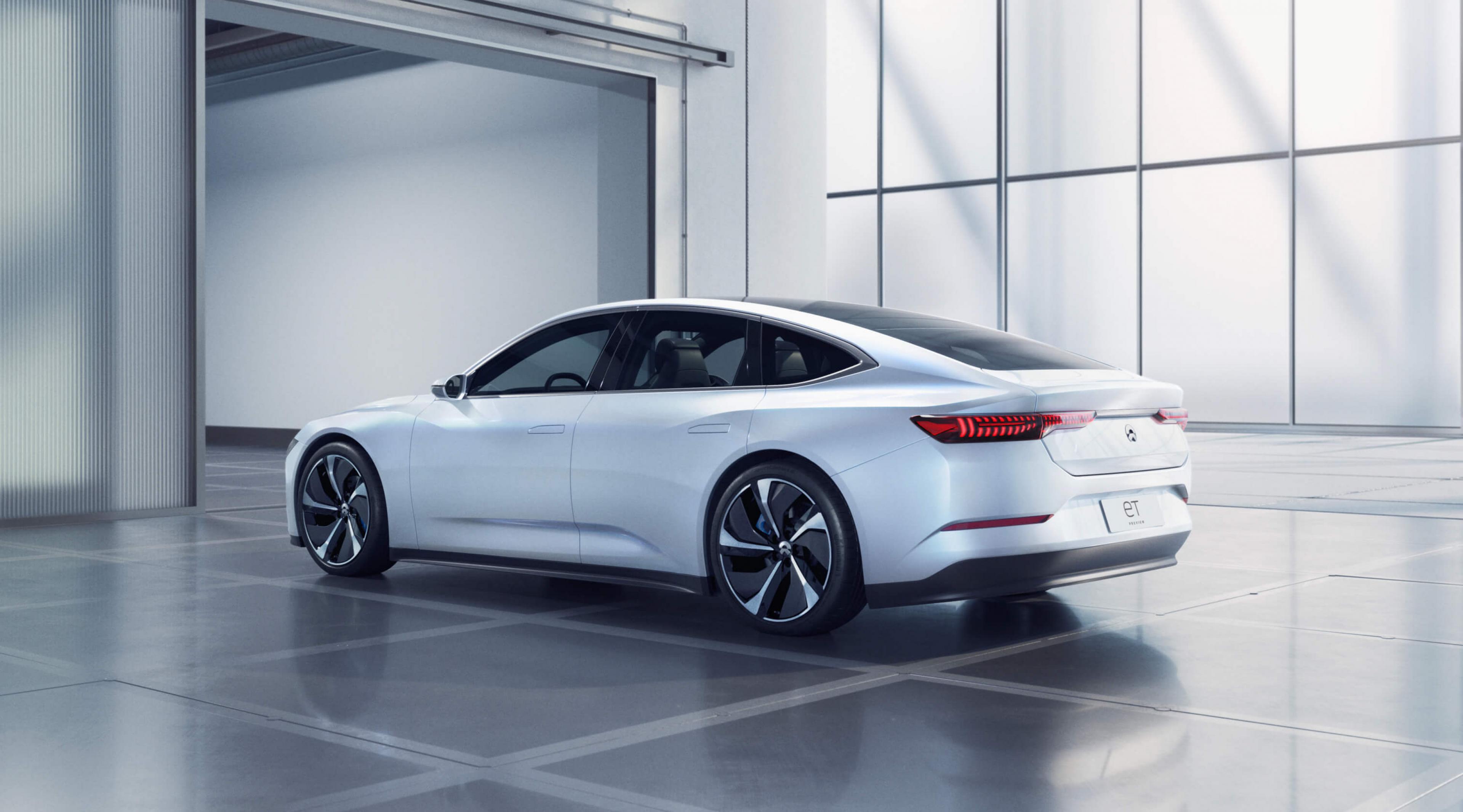 NIO unveils new all-electric sedan and fast-charging station - Electrek