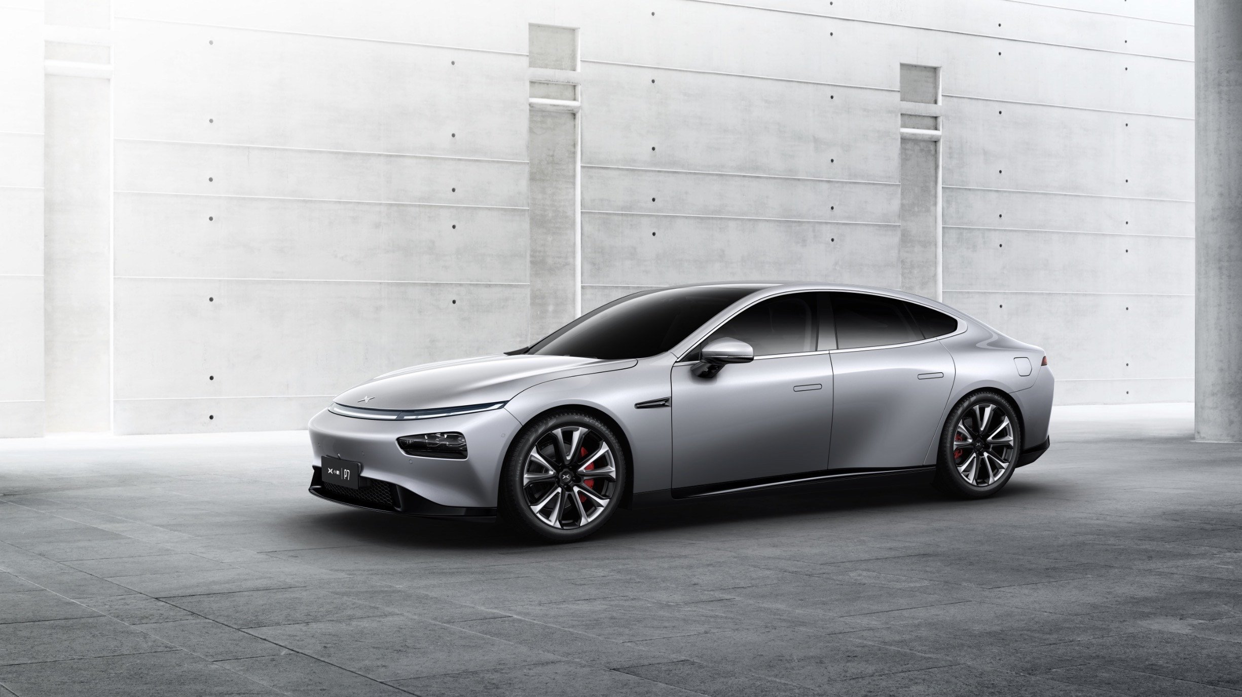 'Tesla-clone' Xpeng unveils new electric sedan with over 300 miles of ...