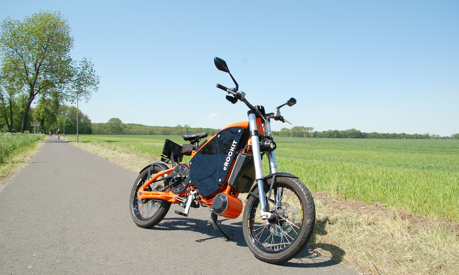 This 50 mph (80 km/h) eRockit electric motorcycle has pedals... but why?