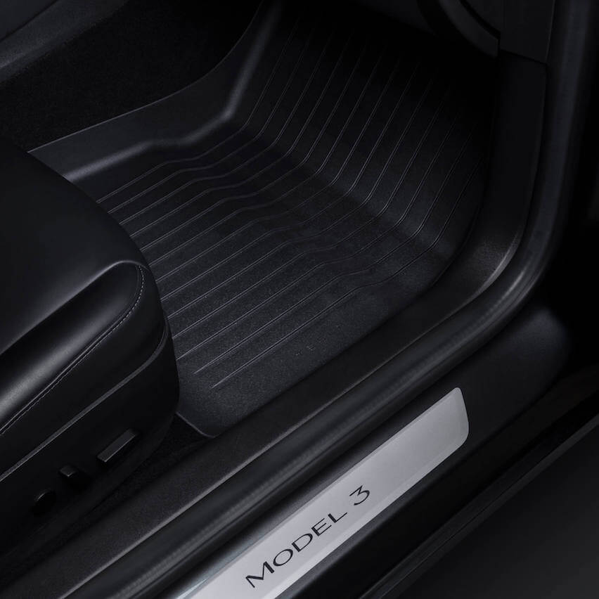 Tesla launches new and better Model 3 floor mats made of recyclable ...