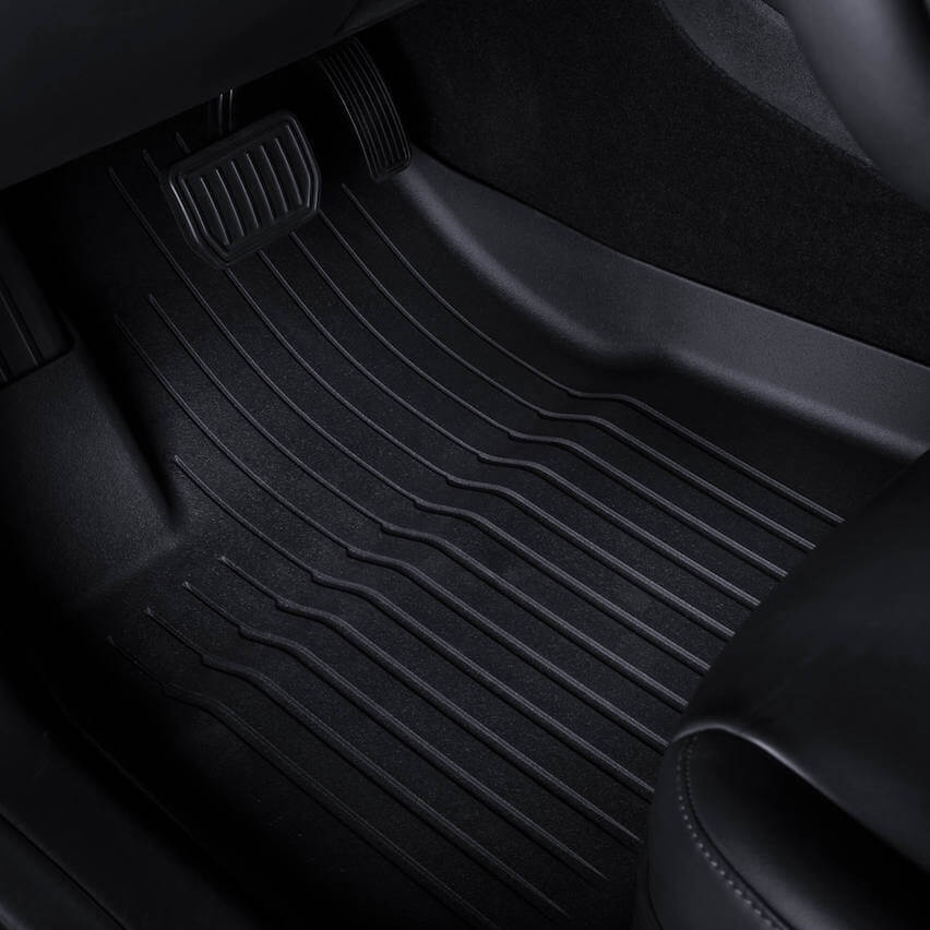 Tesla launches new and better Model 3 floor mats made of recyclable ...