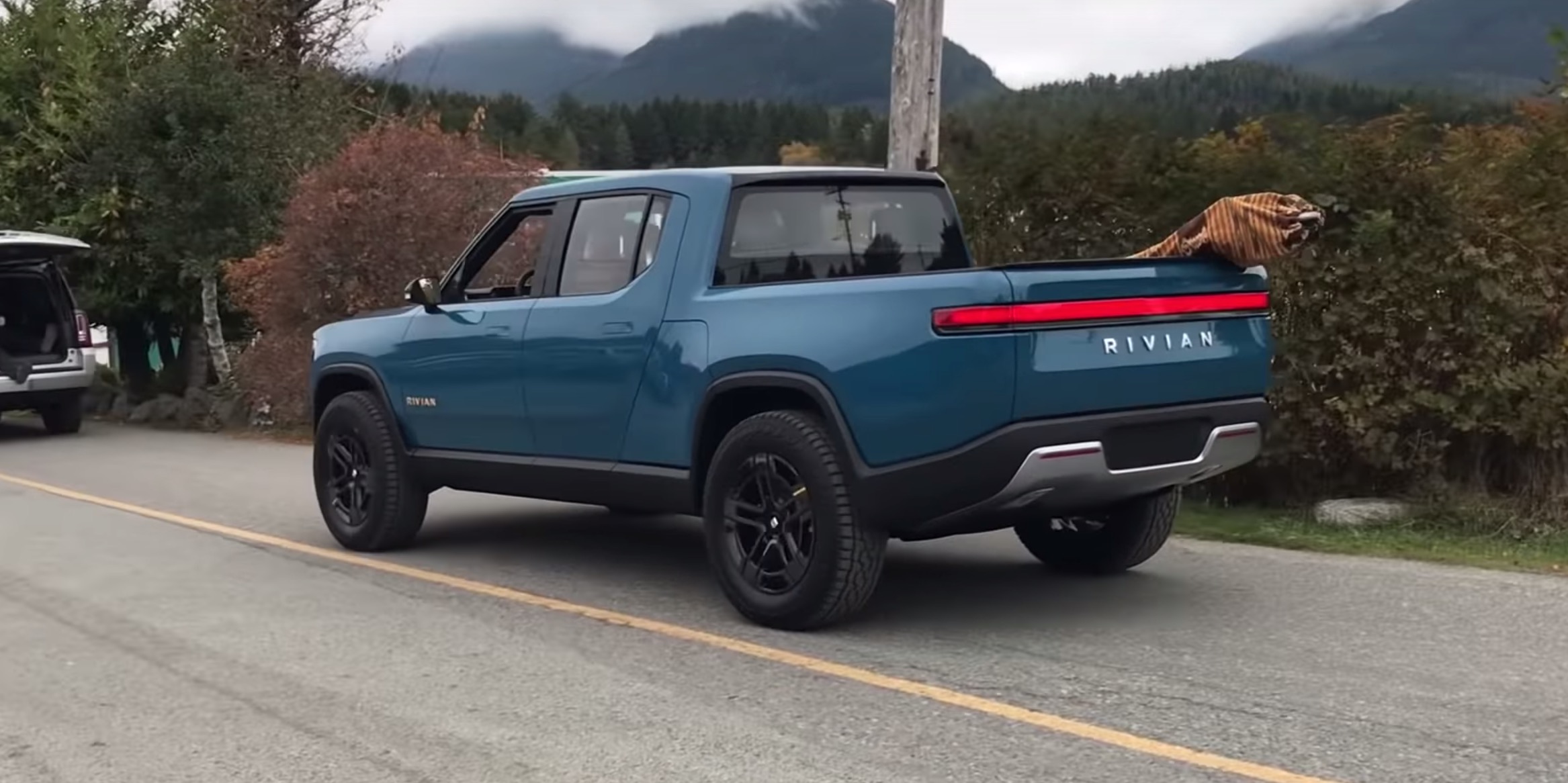 Watch latest Rivian R1T electric pickup prototype spotted driving in ...