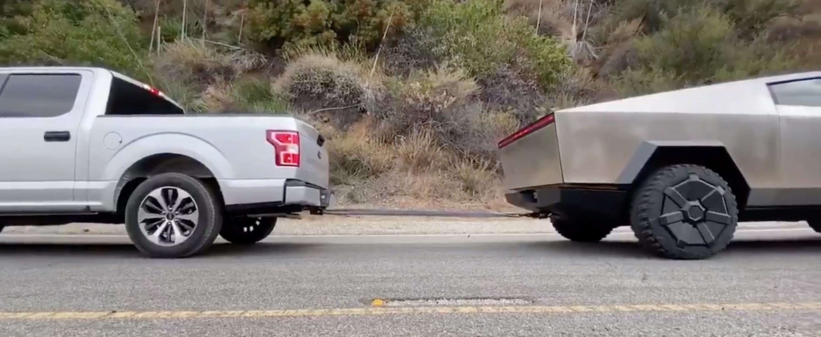 Watch Tesla Cybertruck in tug of war against Ford F150 and size ...
