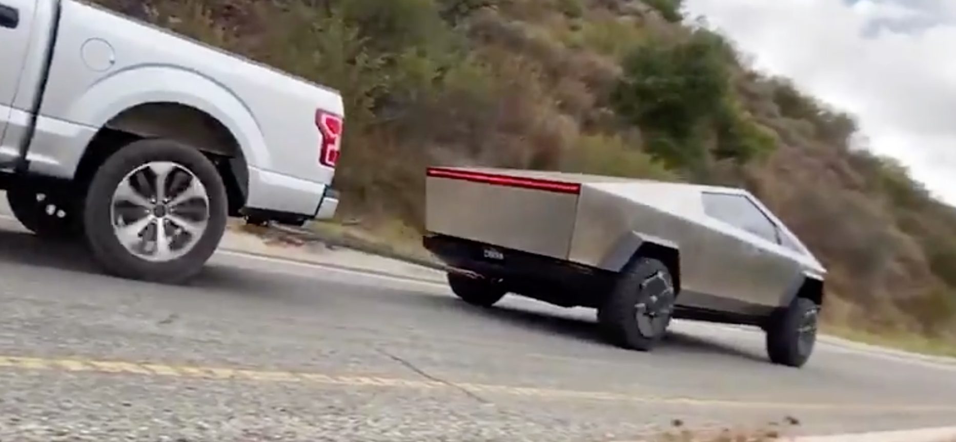 Watch Tesla Cybertruck in tug of war against Ford F150 and size ...