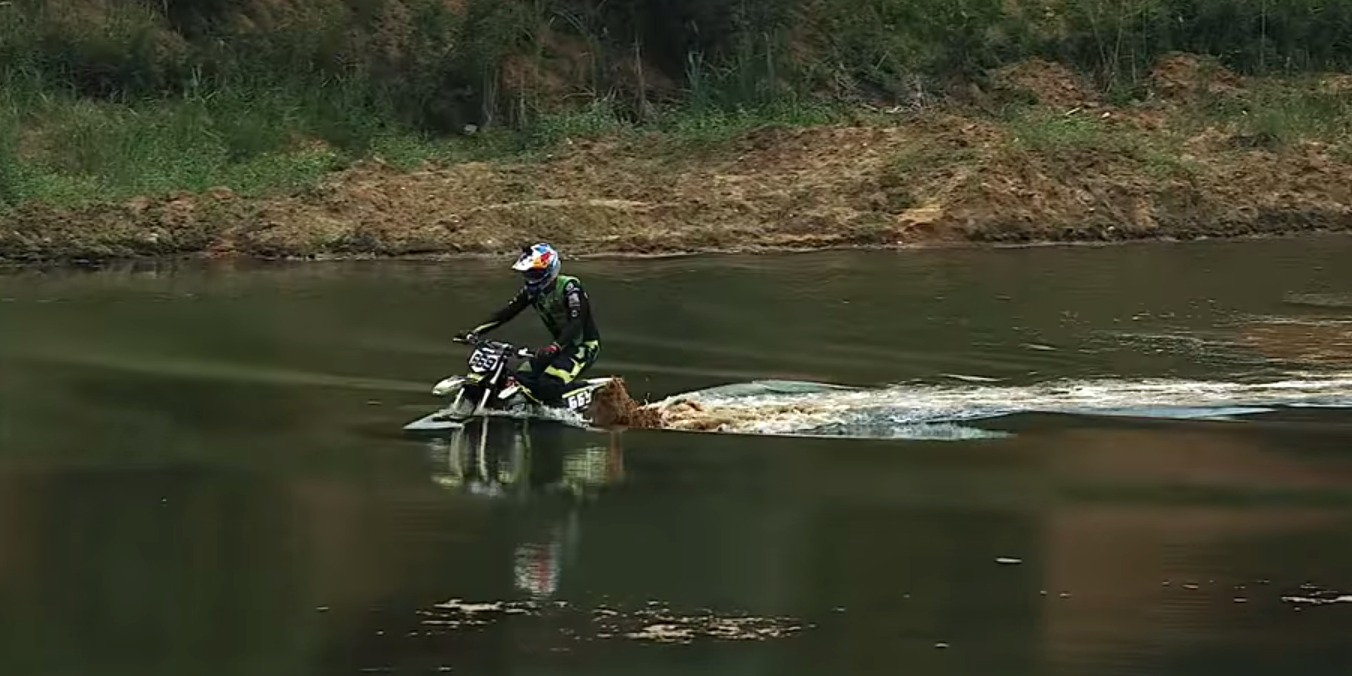 Watch this electric motorcycle ride completely submerged in water ...
