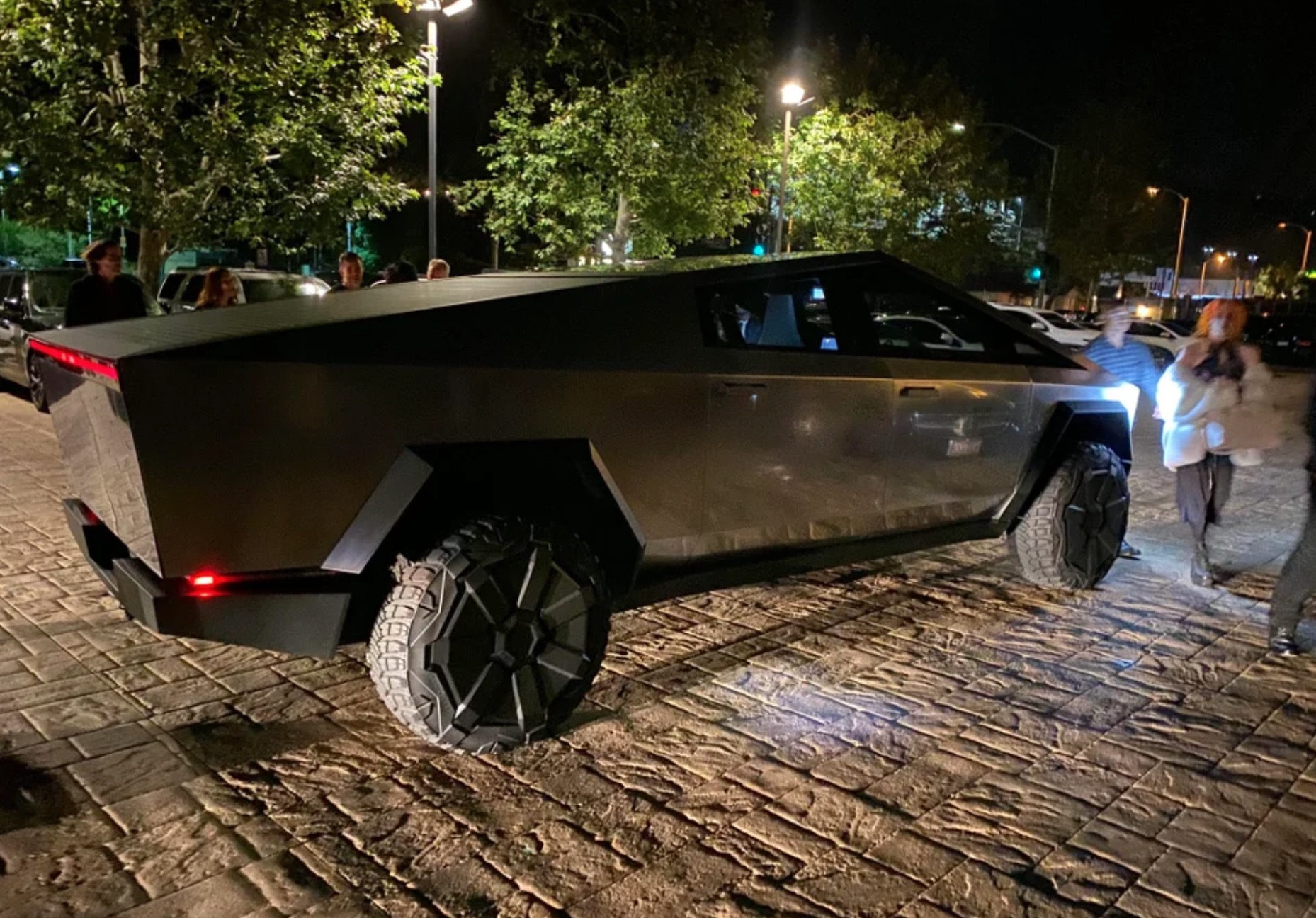 Elon Musk spotted driving Tesla's new Cybertruck electric pickup around ...