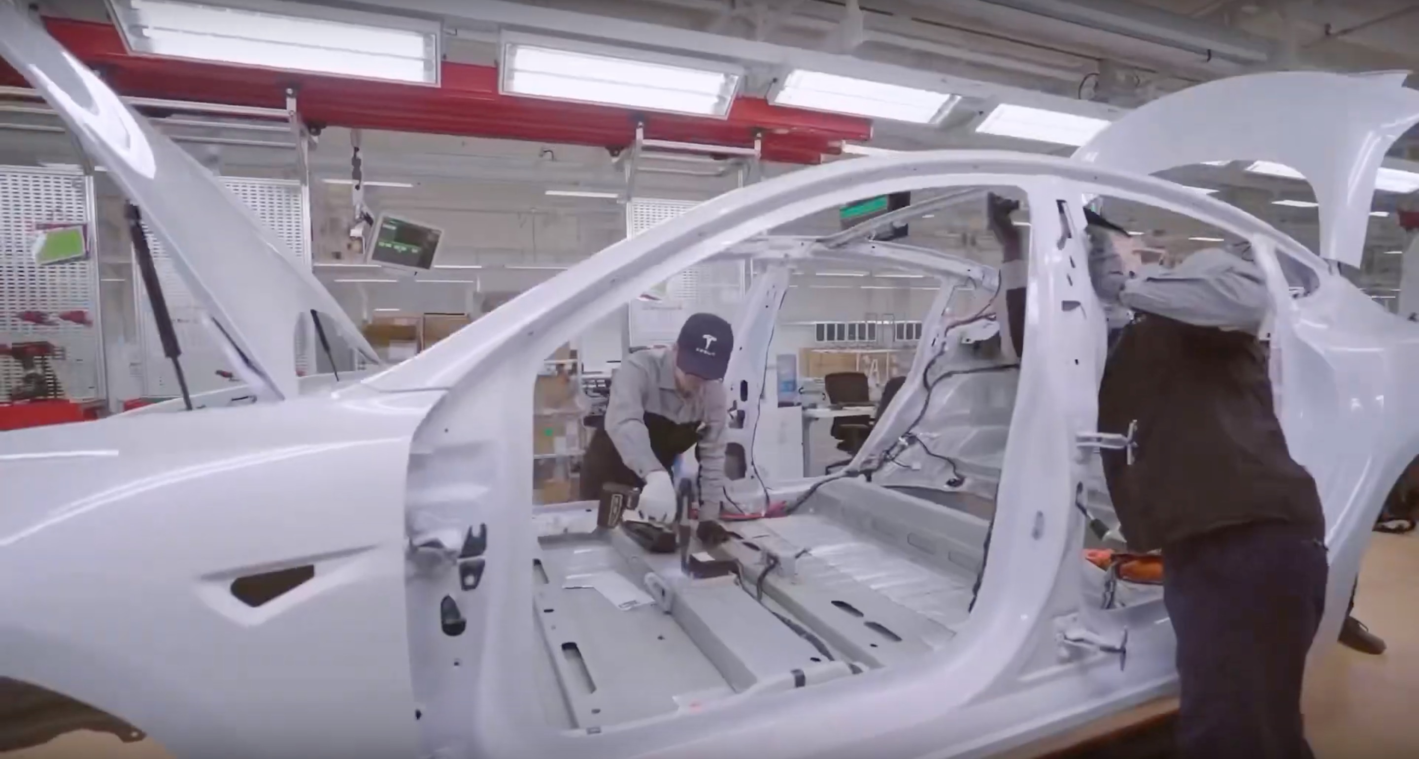Sneak peek inside Tesla Gigafactory 3 in official video - Electrek