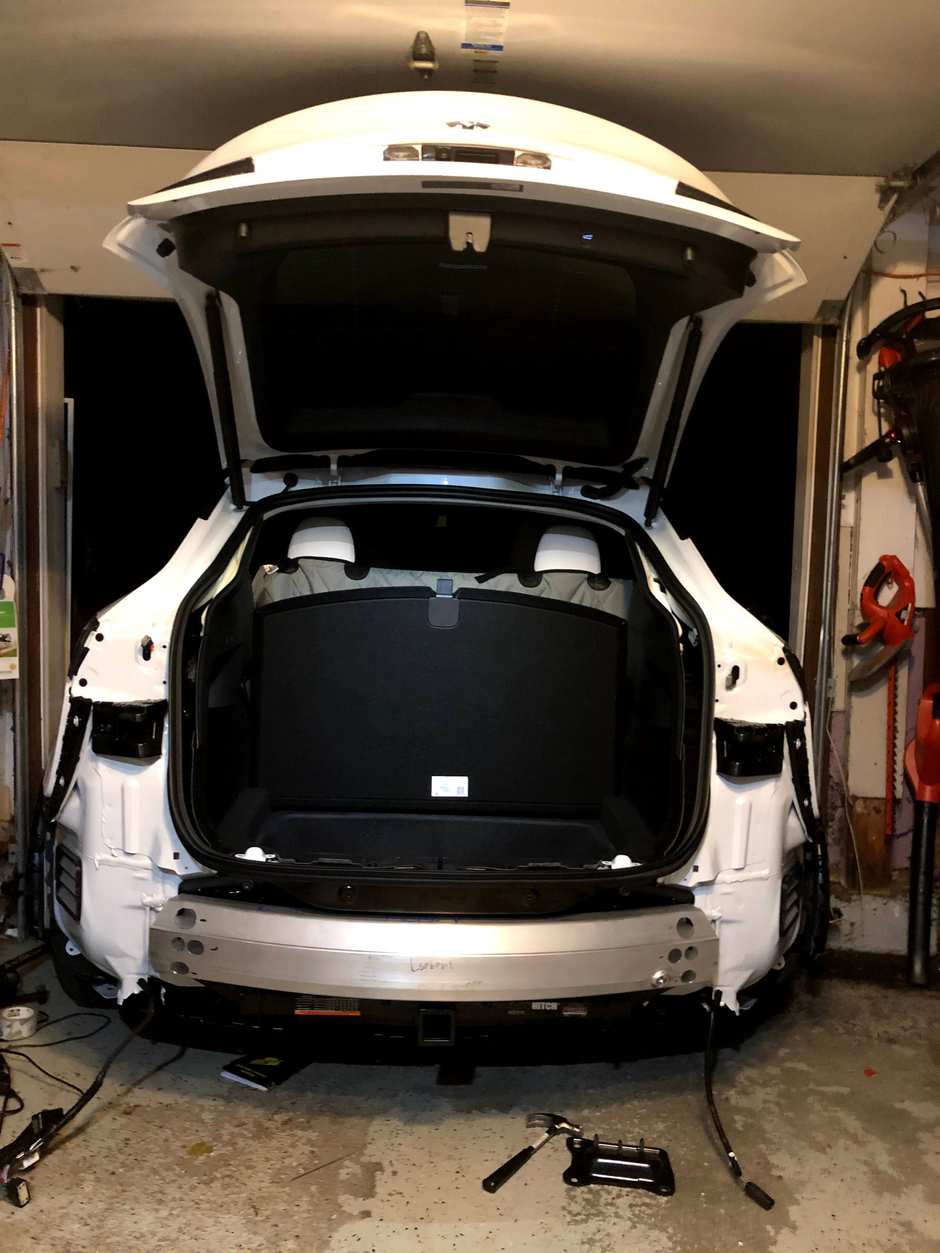 Tesla Model Y diary day 3: Installing a $320 tow hitch | Electrek
