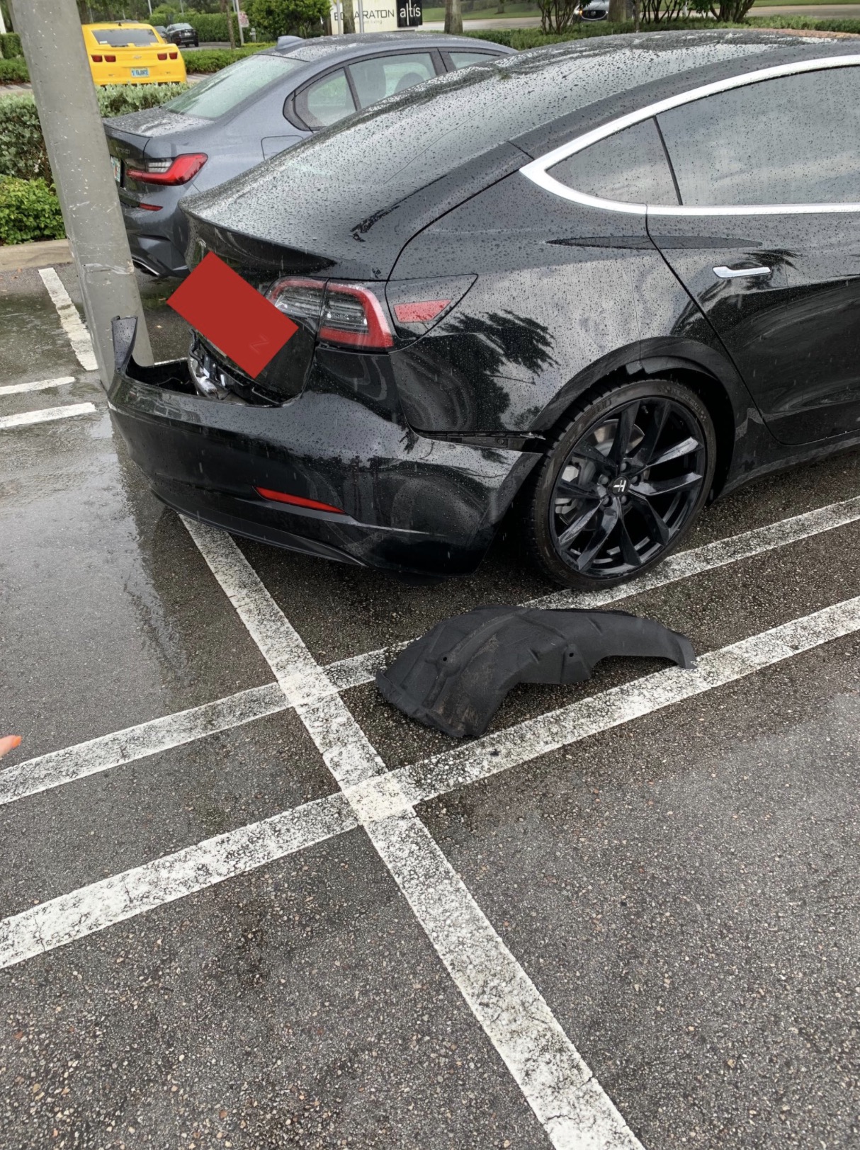 Video of Tesla Model 3 losing rear bumper in puddle of water goes viral ...