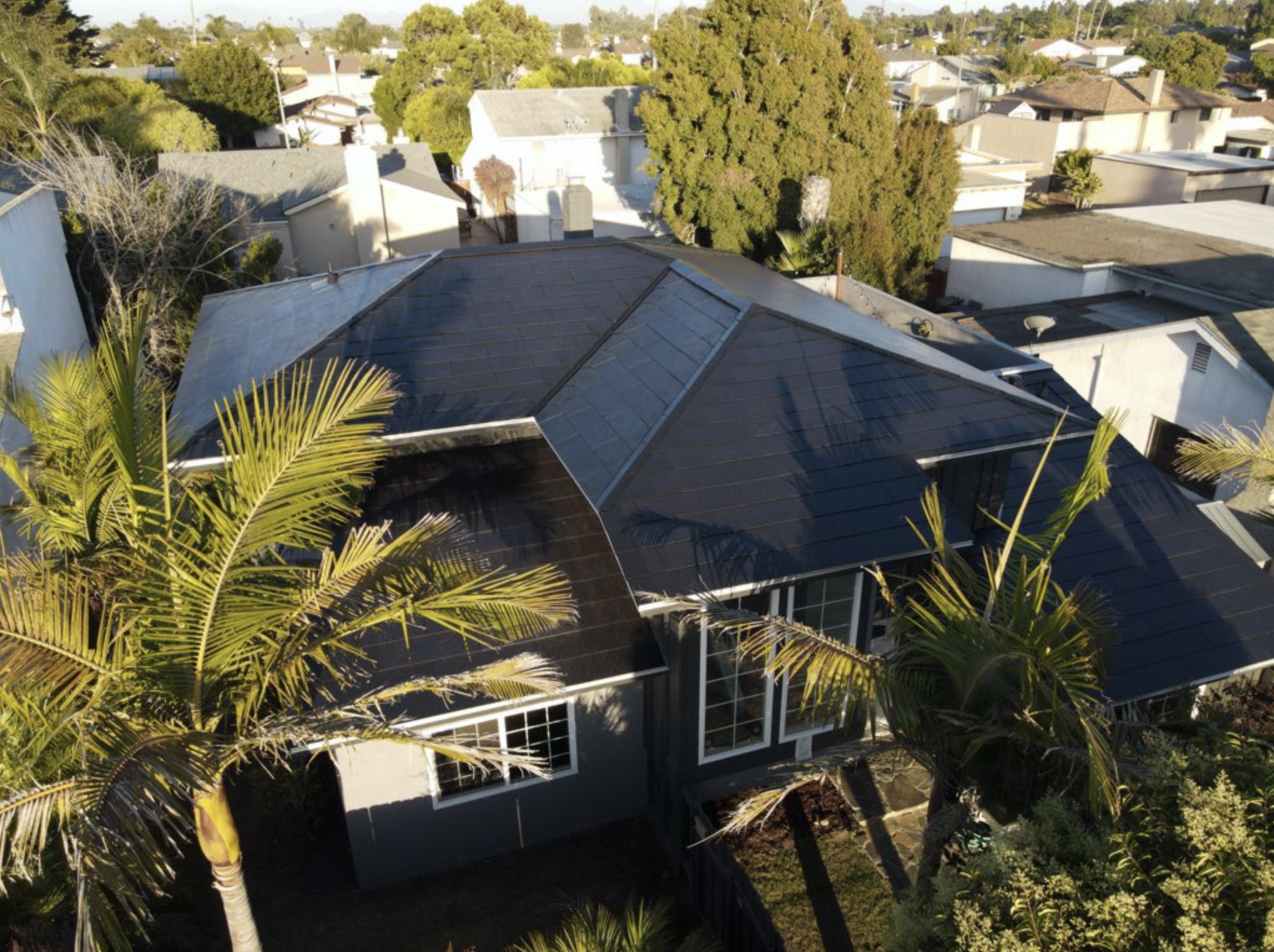 A Tesla Solar Roof system is deployed for under $30,000 | Electrek