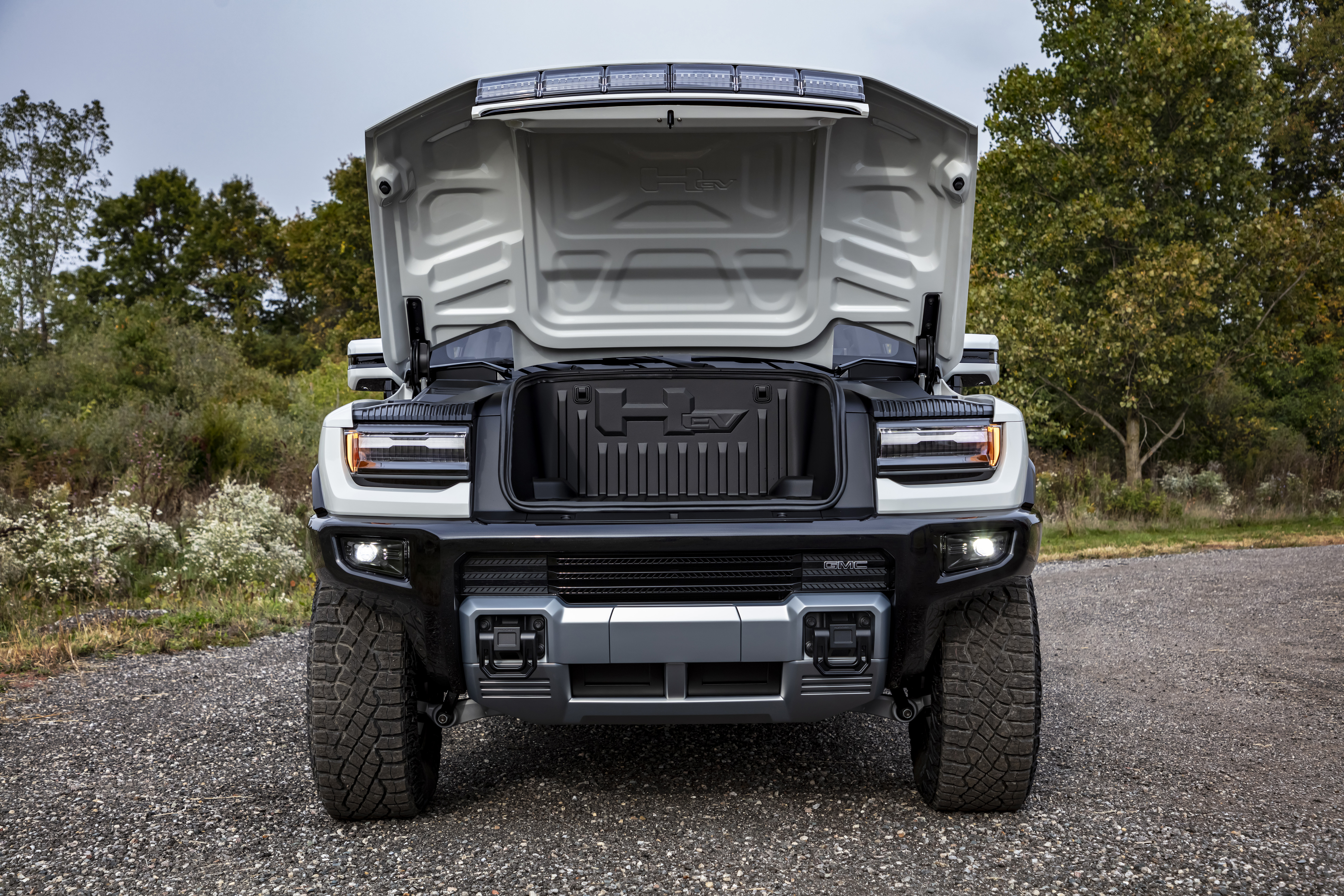 Watch GMC HUMMER EV electric pickup truck do some donuts in the snow ...