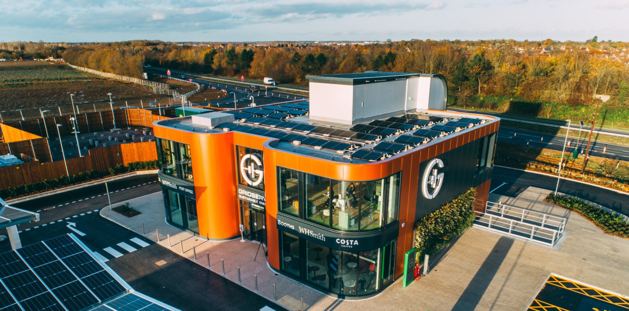 UK opens first fully electric vehicle service station, powered by solar ...