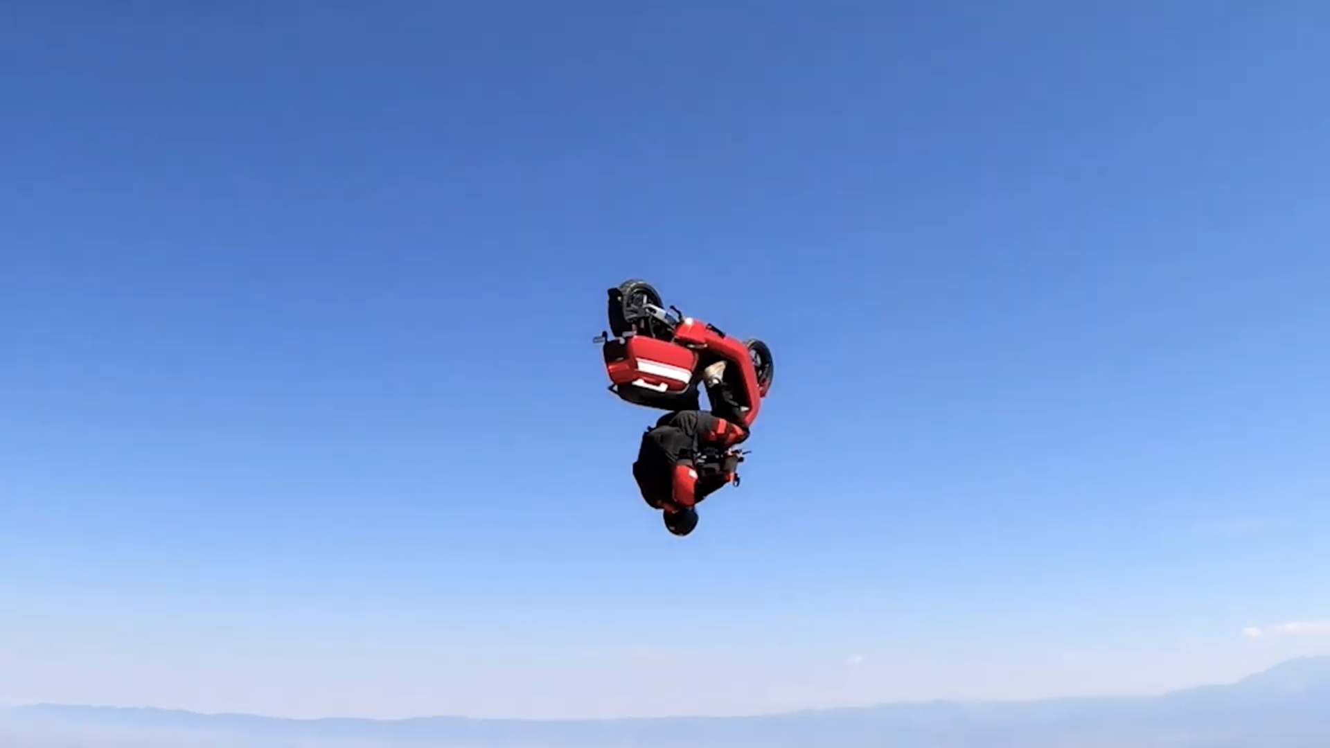 Watch this NIU electric scooter ride out of an airplane in skydiving stunt