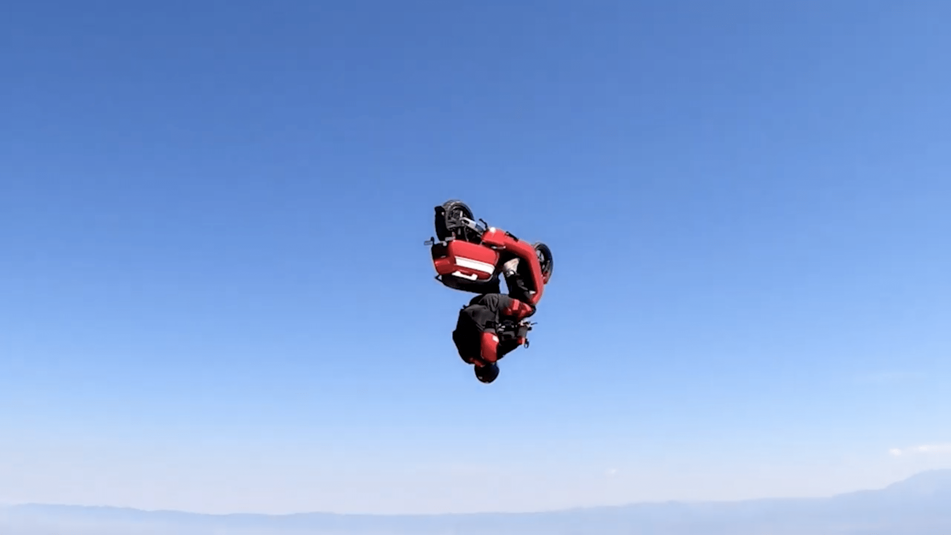Watch this NIU electric scooter ride out of an airplane in skydiving stunt