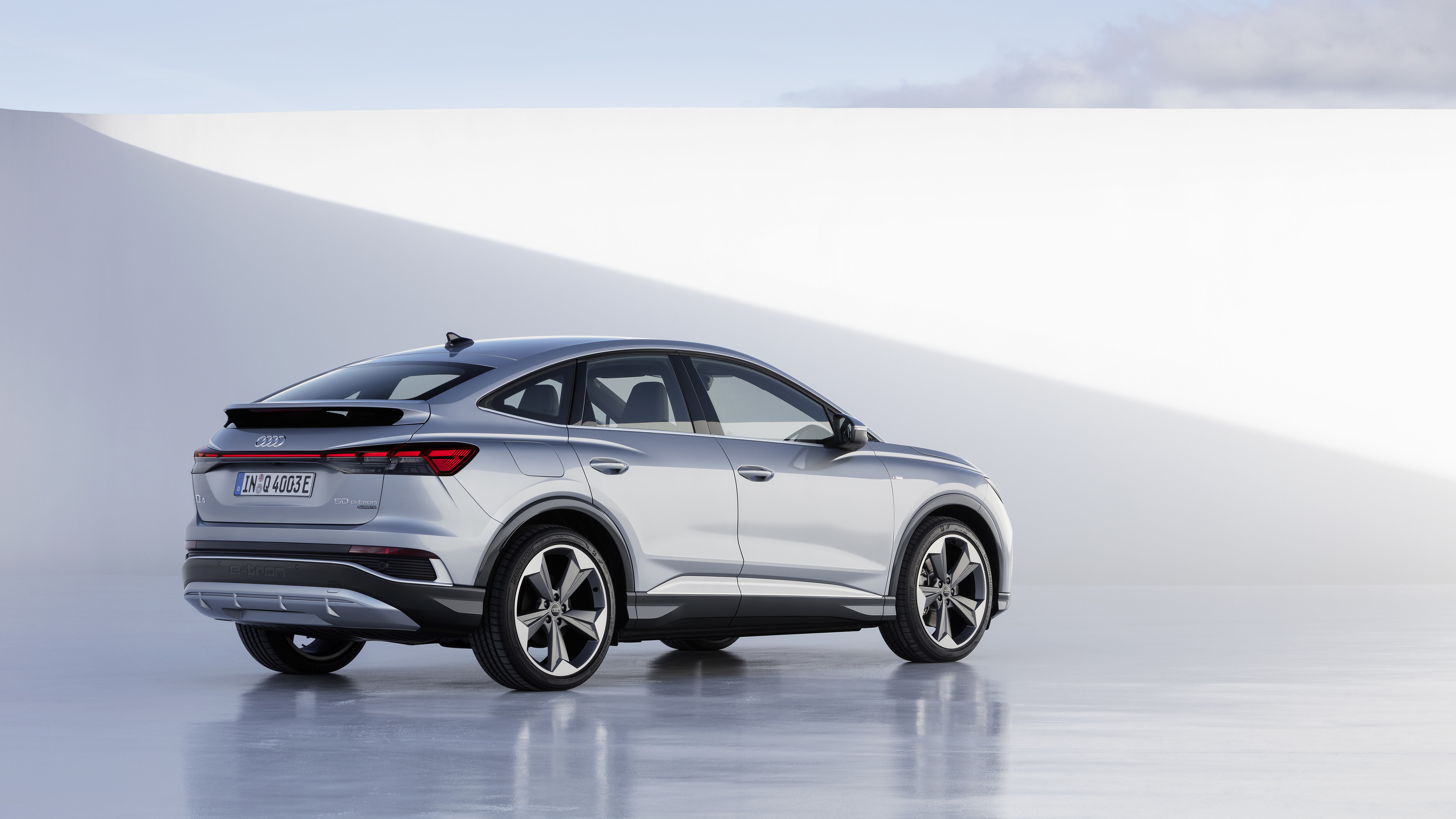 Audi unveils production version of e-tron Q4 electric SUV with over 300 ...