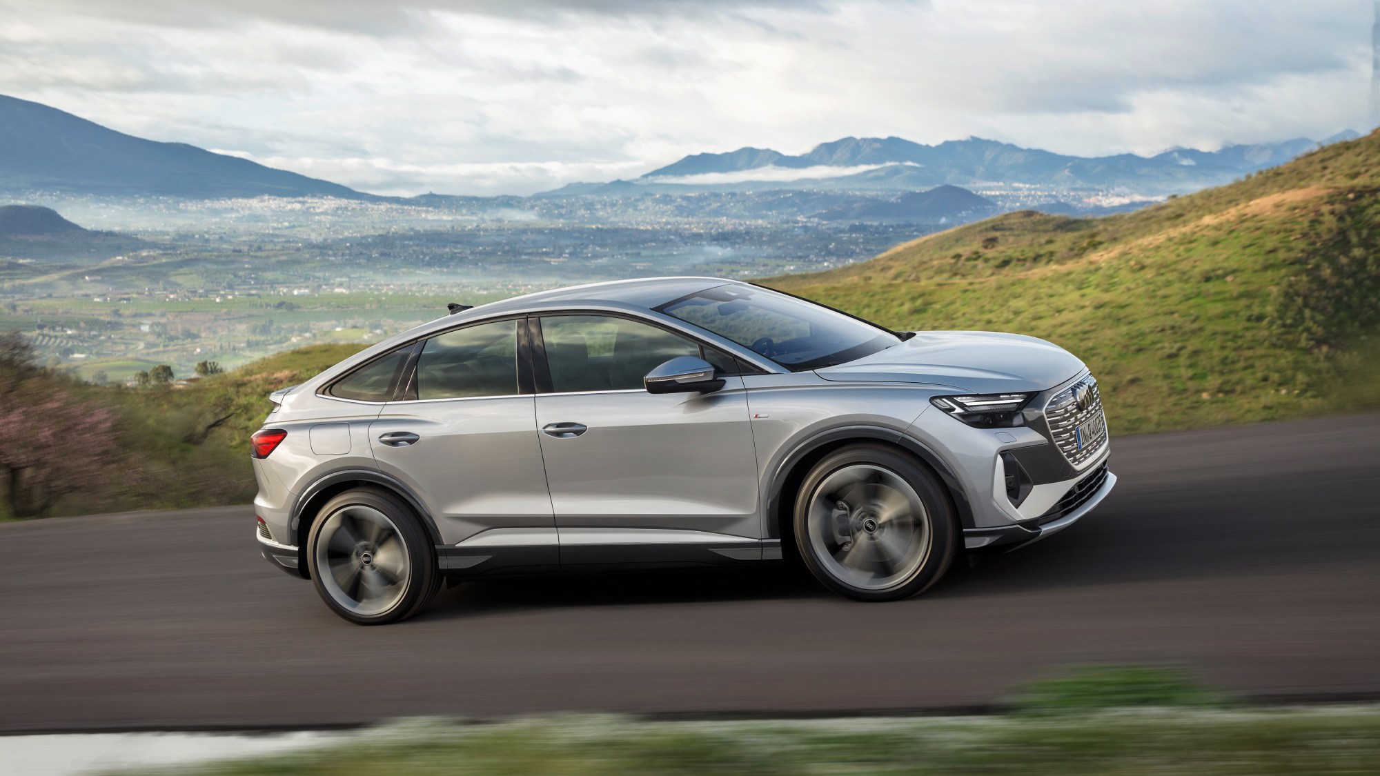 Audi unveils production version of e-tron Q4 electric SUV with over 300 ...