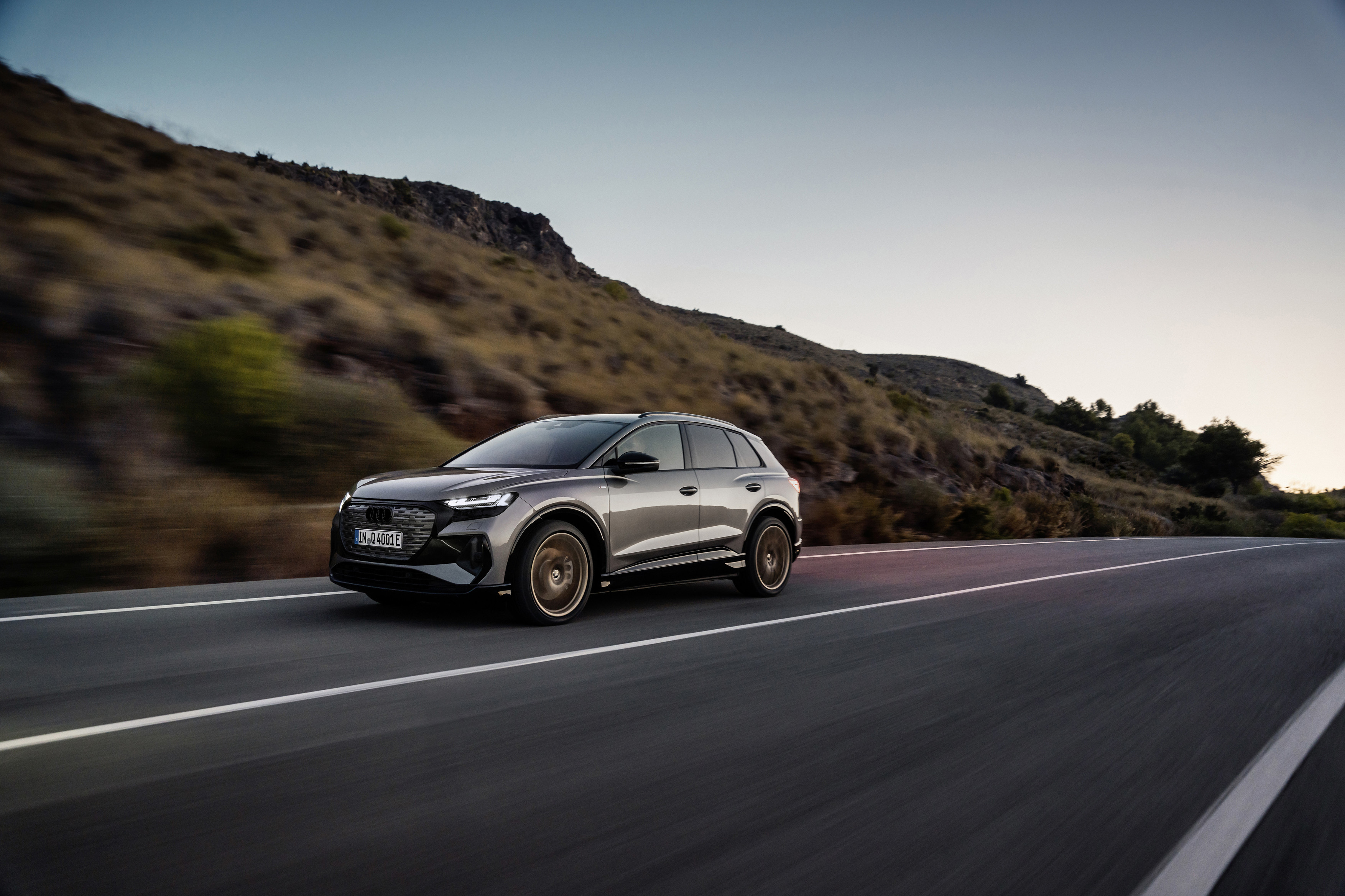 Audi unveils production version of e-tron Q4 electric SUV with over 300 ...