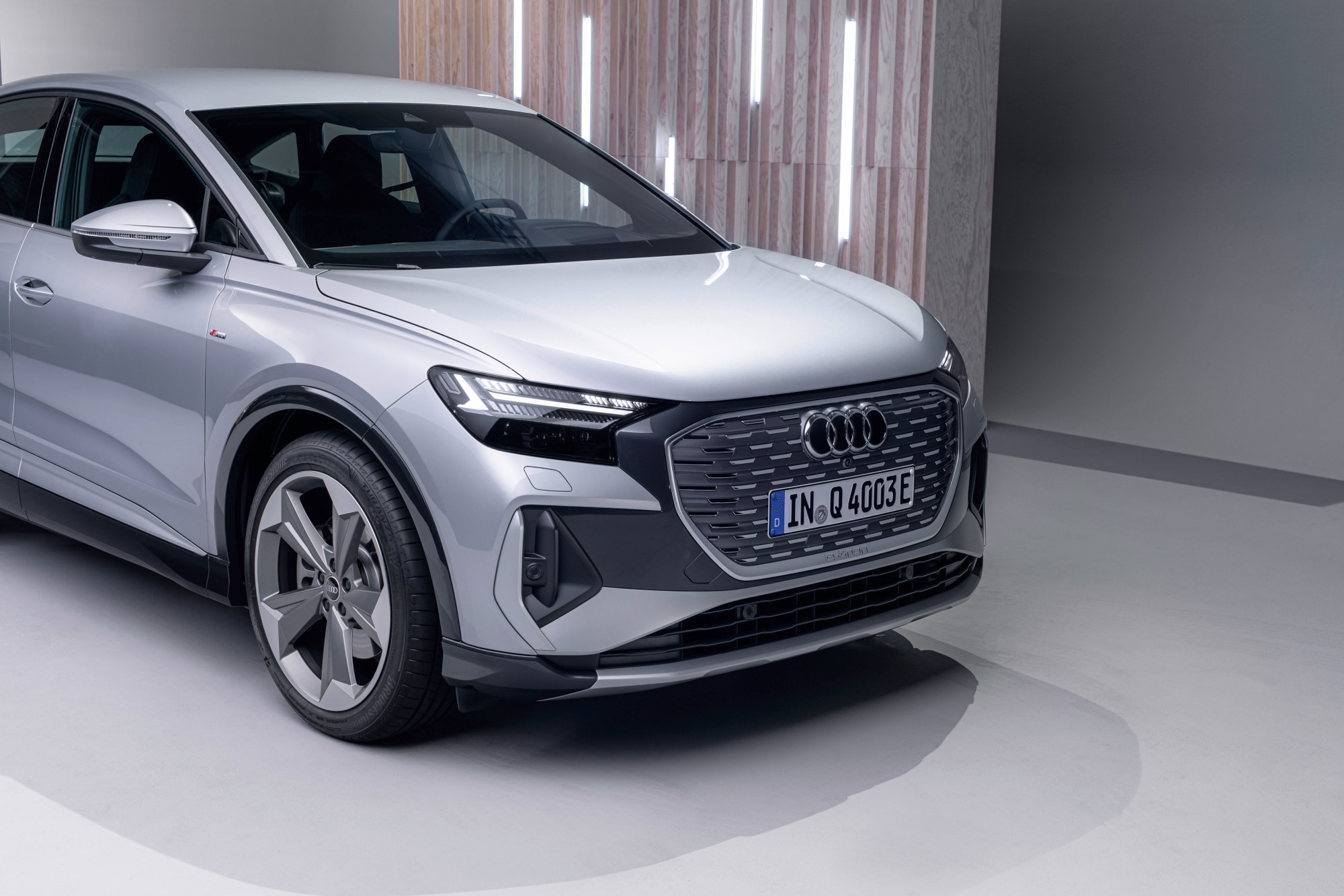 Audi unveils production version of e-tron Q4 electric SUV with over 300 ...