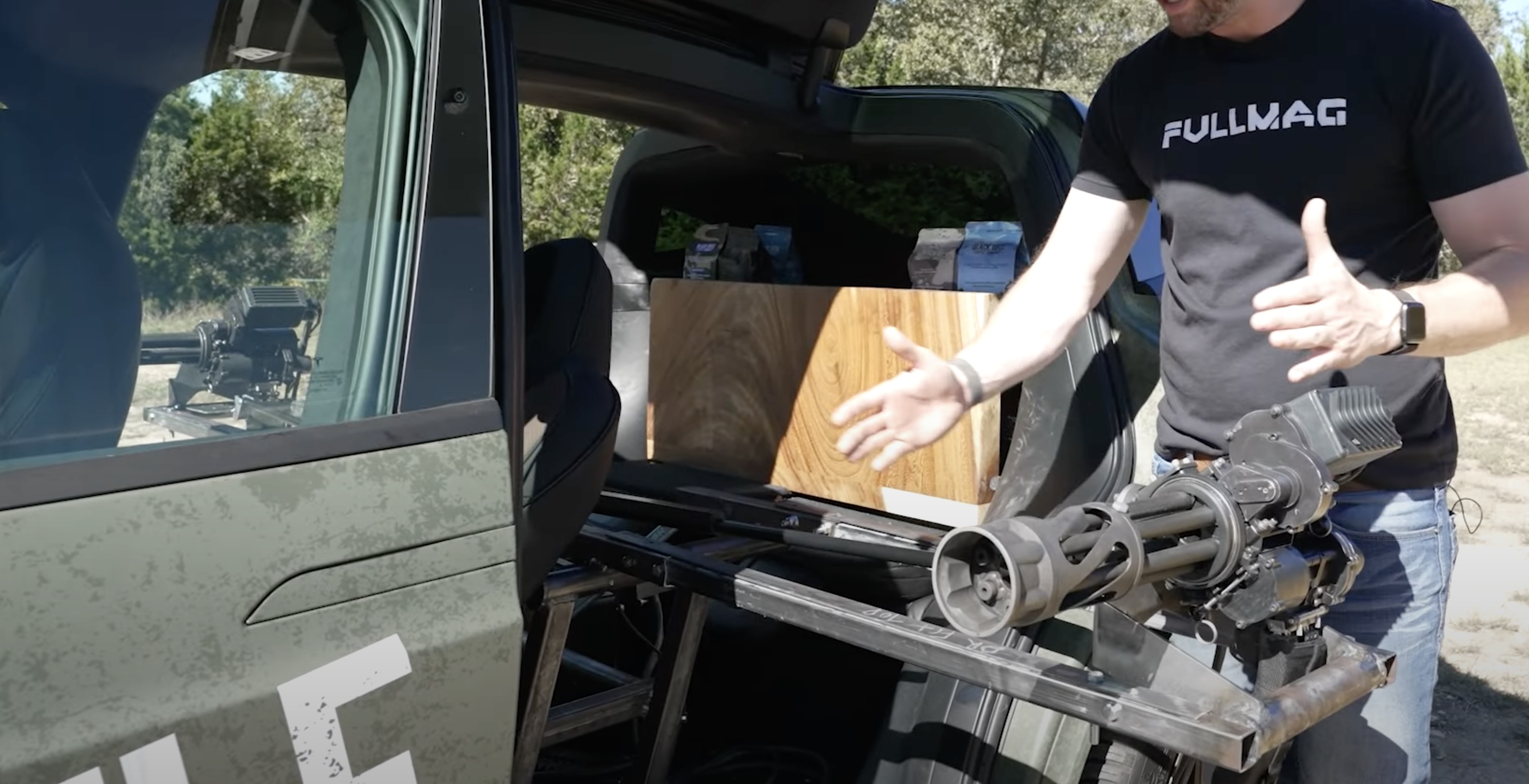 Tesla Model X gets turned into war machine with dual machine guns ...