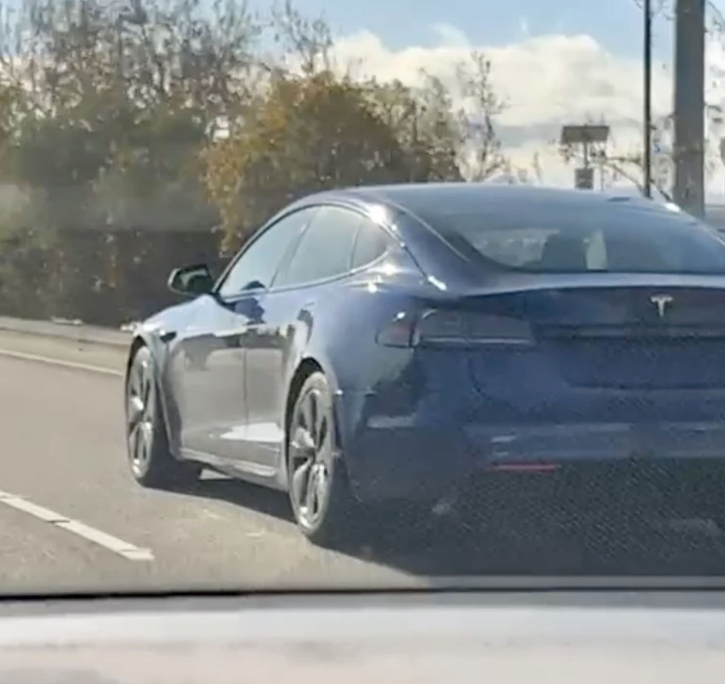 Tesla Model S prototype spotted with new charge port and taillights ...