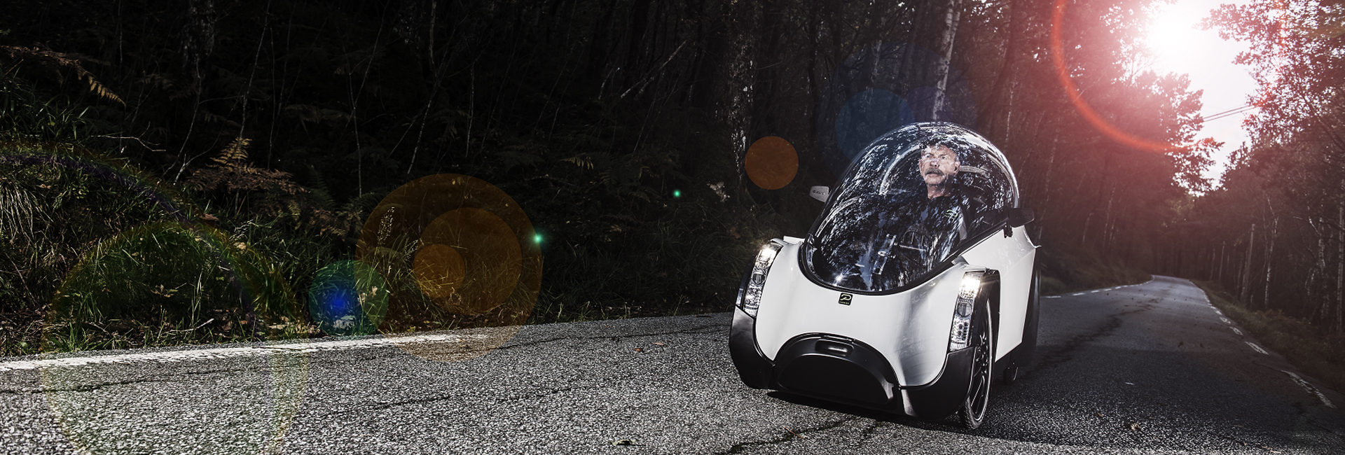 Podbike's enclosed four-wheeled electric bike-car begins deliveries in 2022