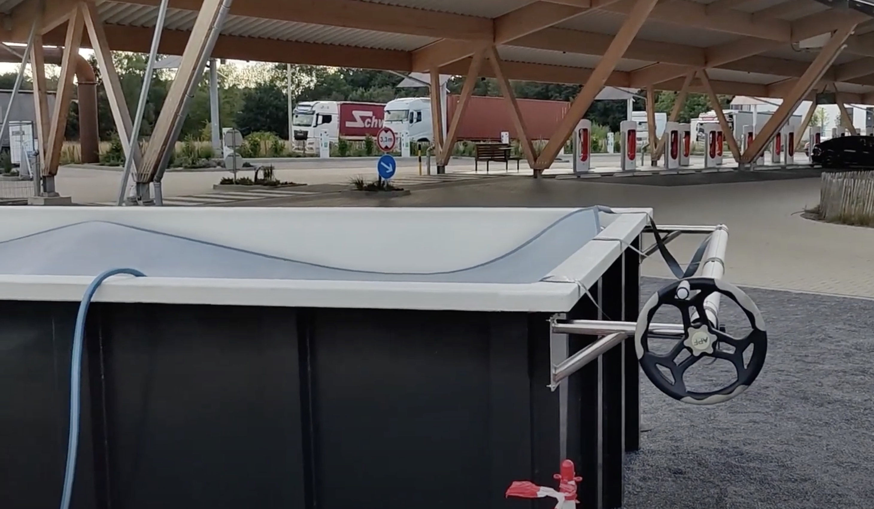 Tesla deploys swimming pool at Supercharger station | Electrek