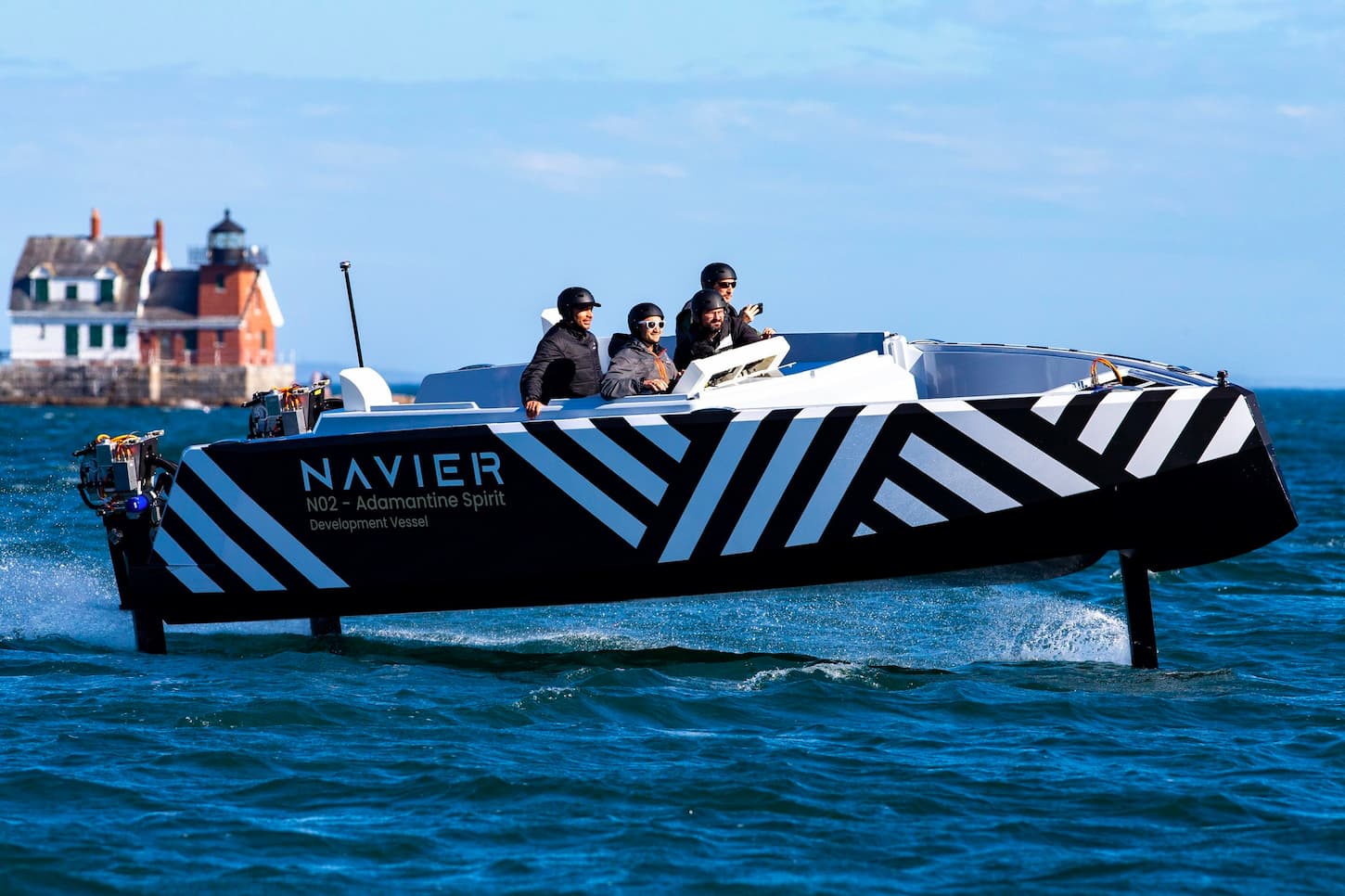 Navier's long range electric hydrofoil boat autonomously docks itself