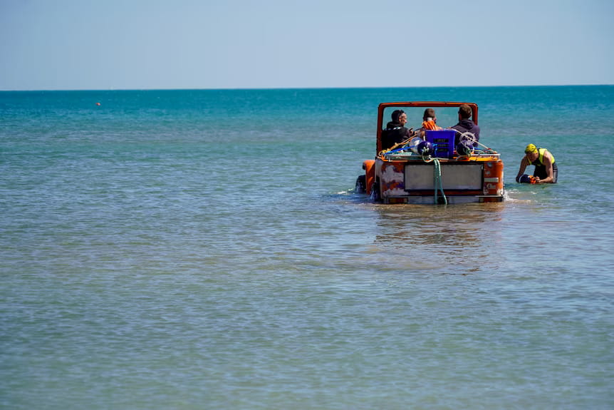 Electric retrofit LandCruiser drives 4 miles completely underwater