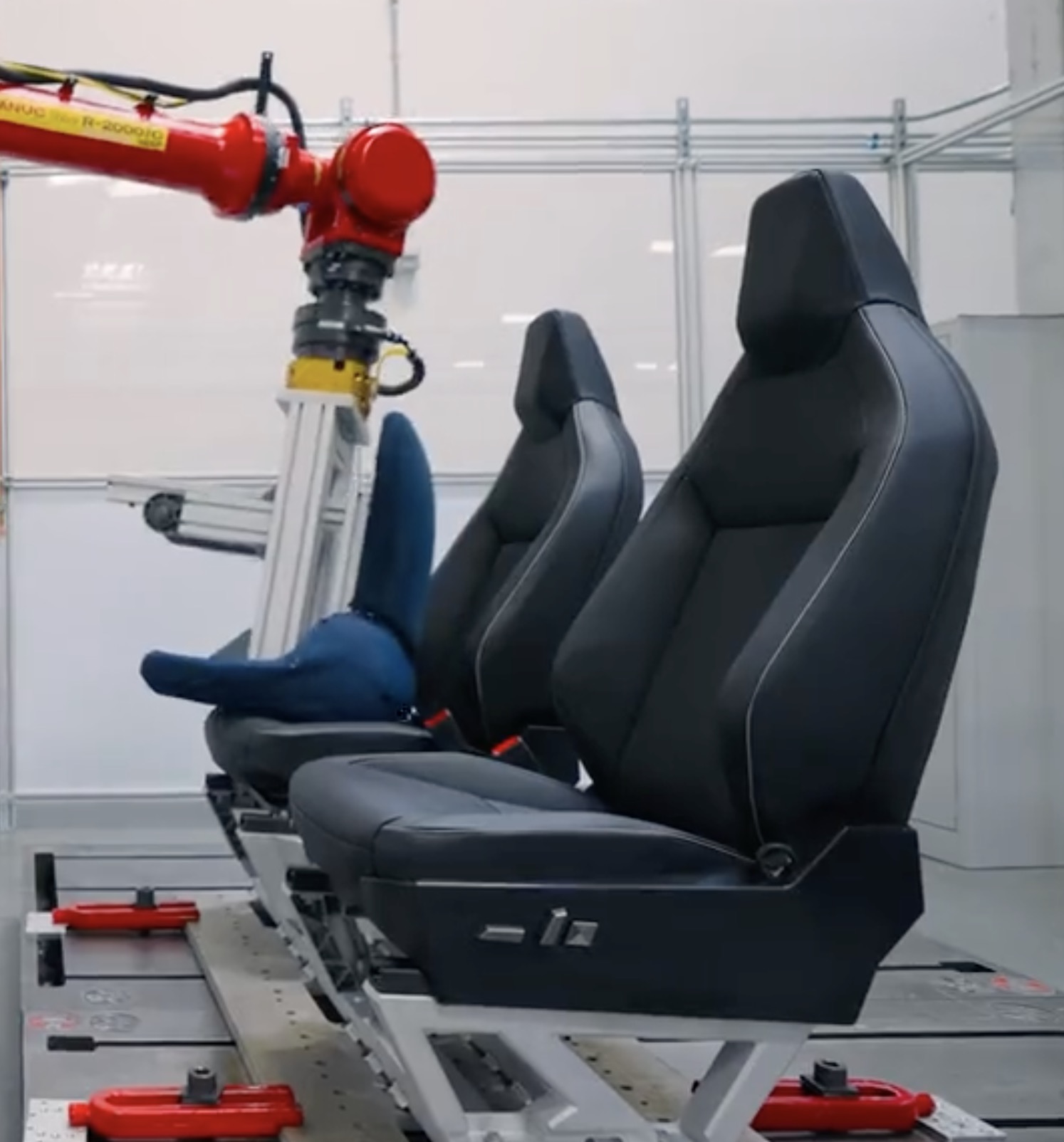 Tesla reveals Cybertruck seats in butt robot video | Electrek